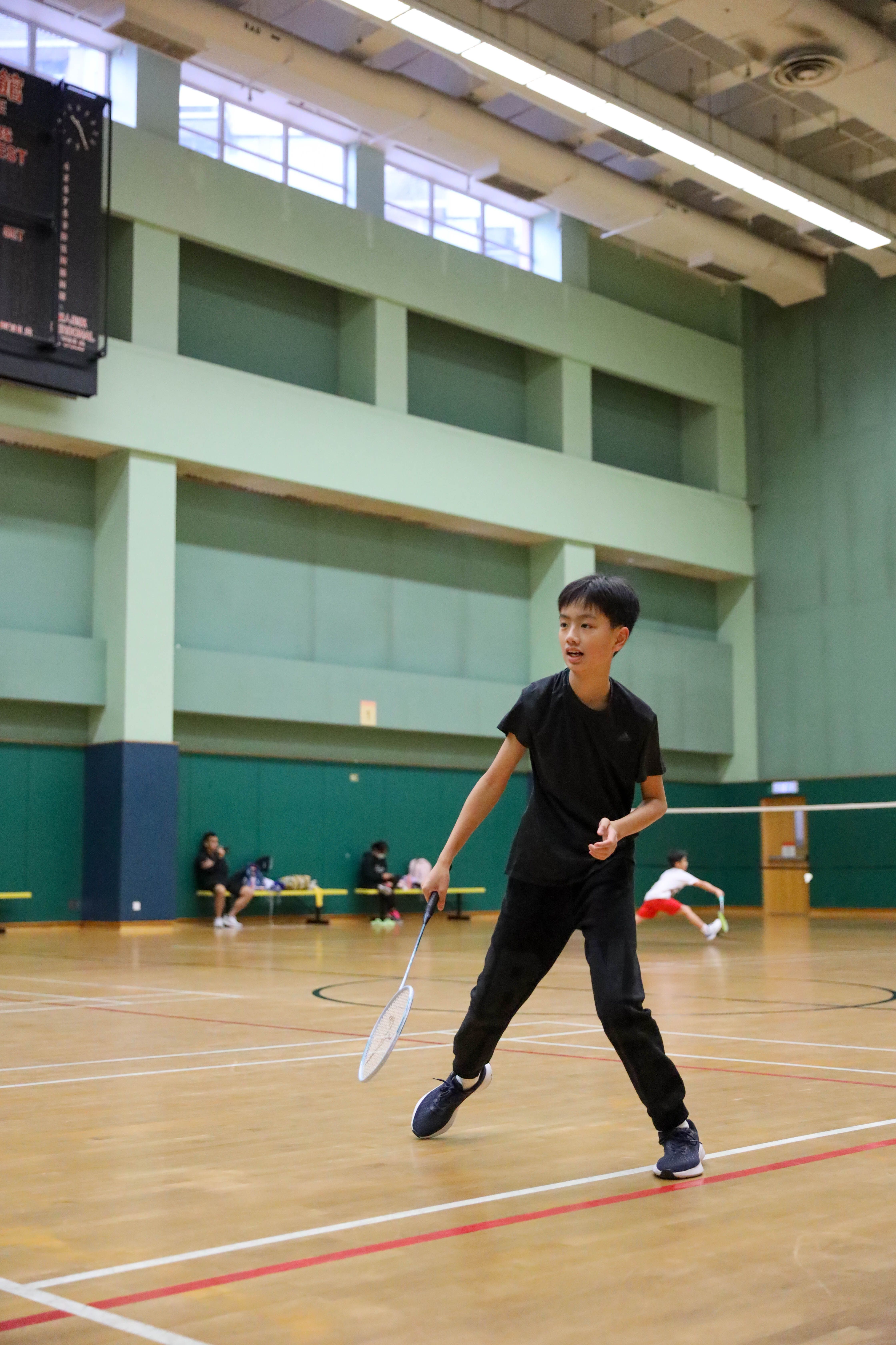Man Playing Badminton at the Gym · Free Stock Photo