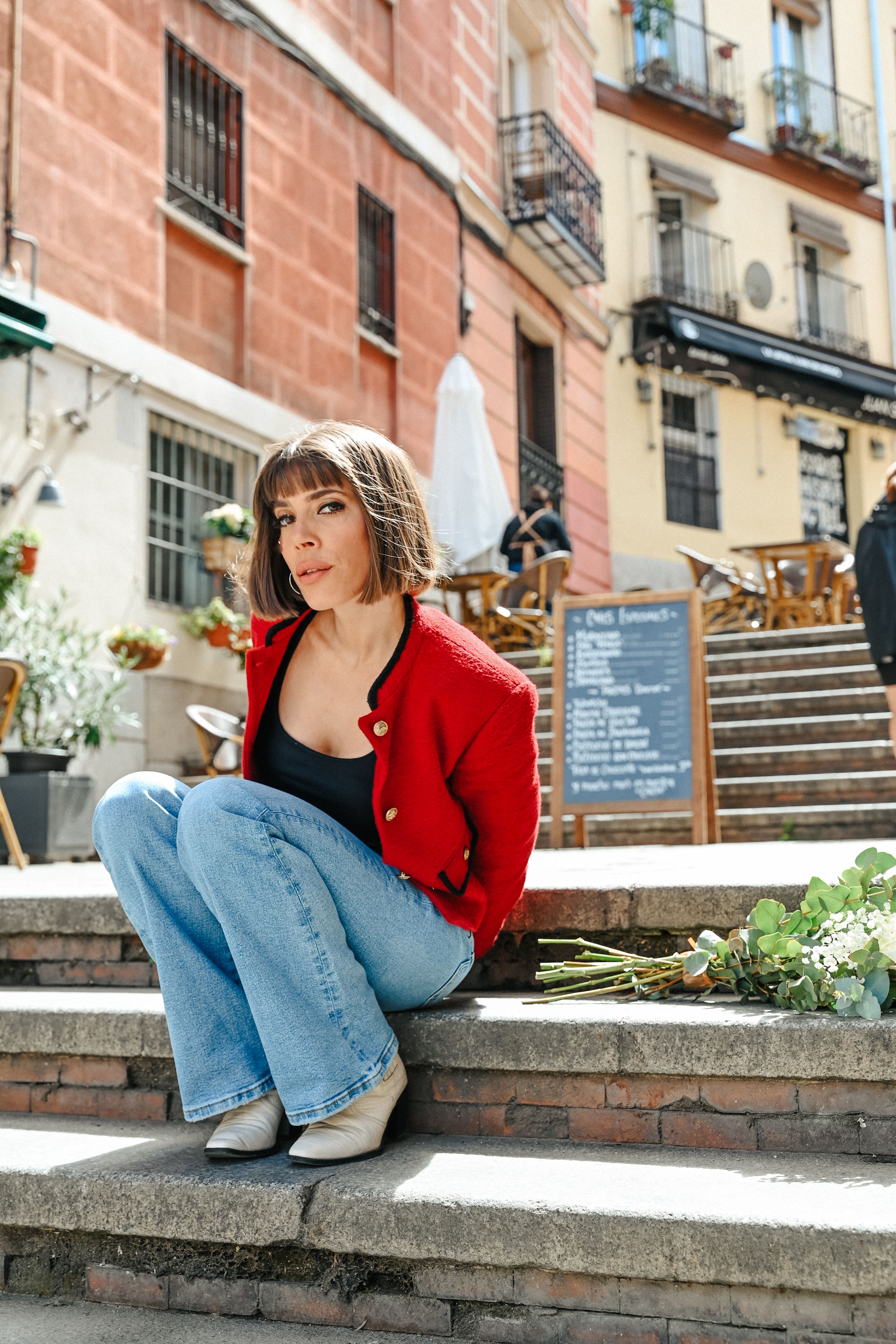 A Fashionable Woman Sitting on the Steps · Free Stock Photo