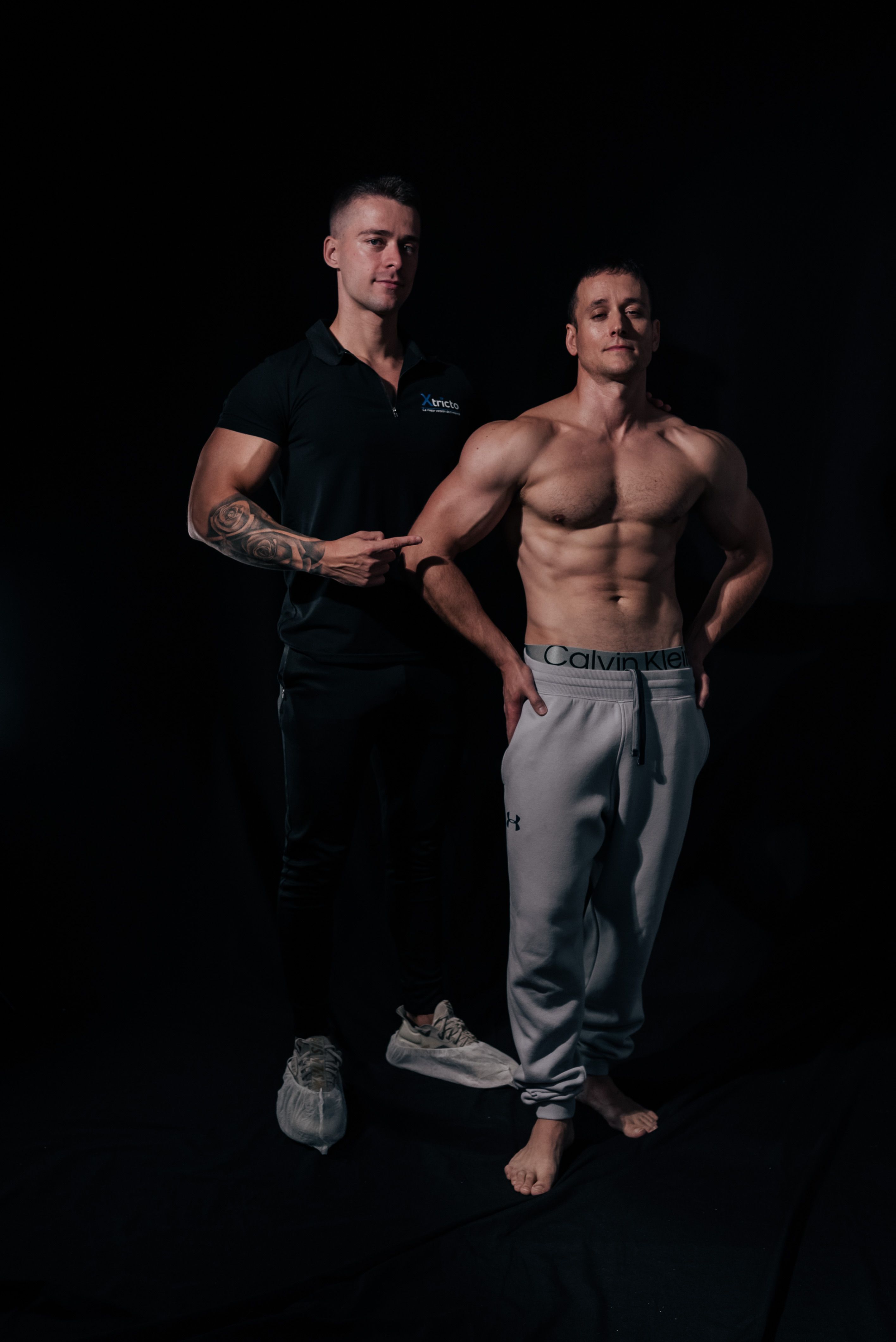 Photo of a Muscular Man and His Personal Trainer · Free Stock Photo