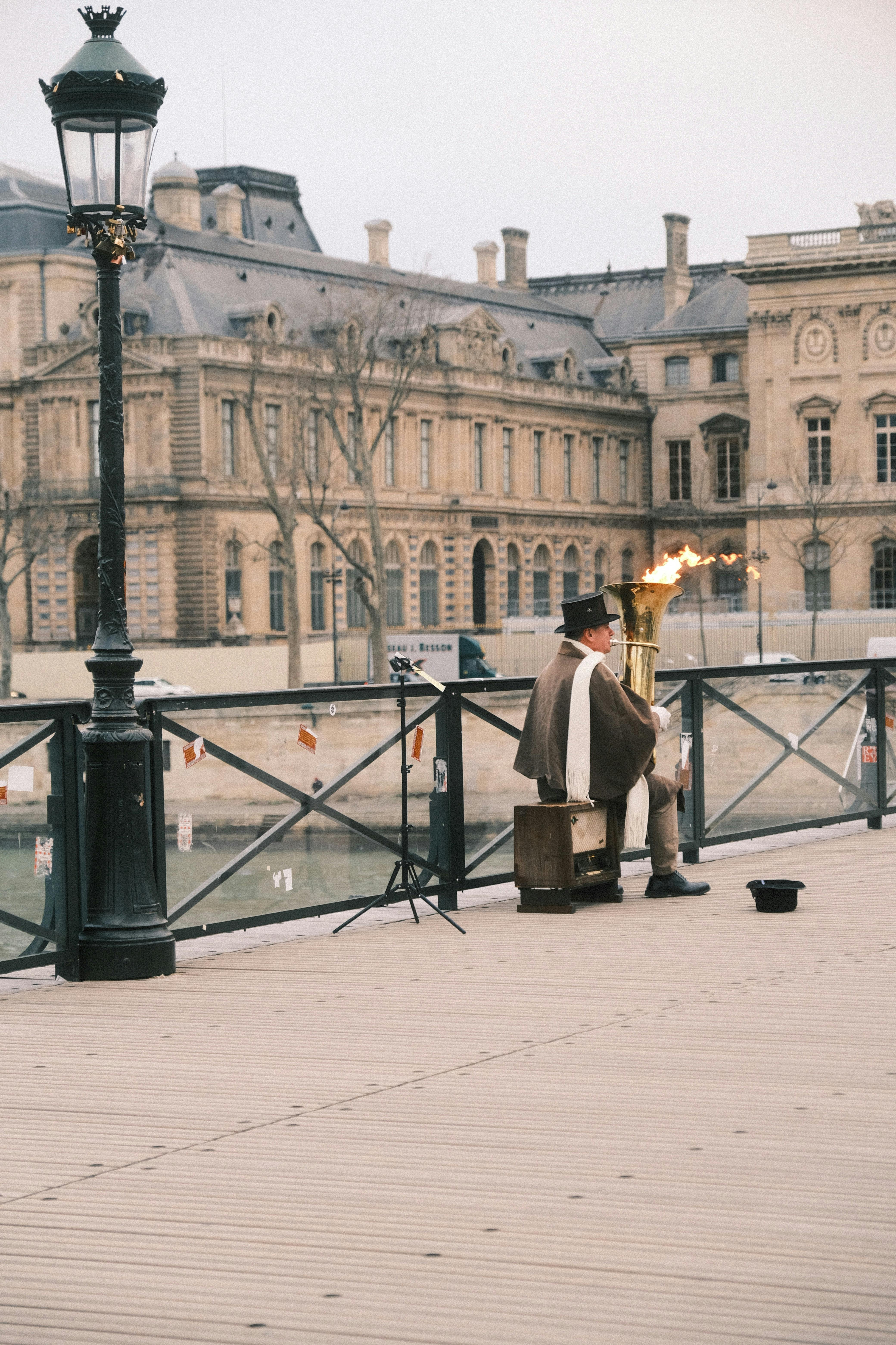 Man Blowing Flame Out from Tuba · Free Stock Photo