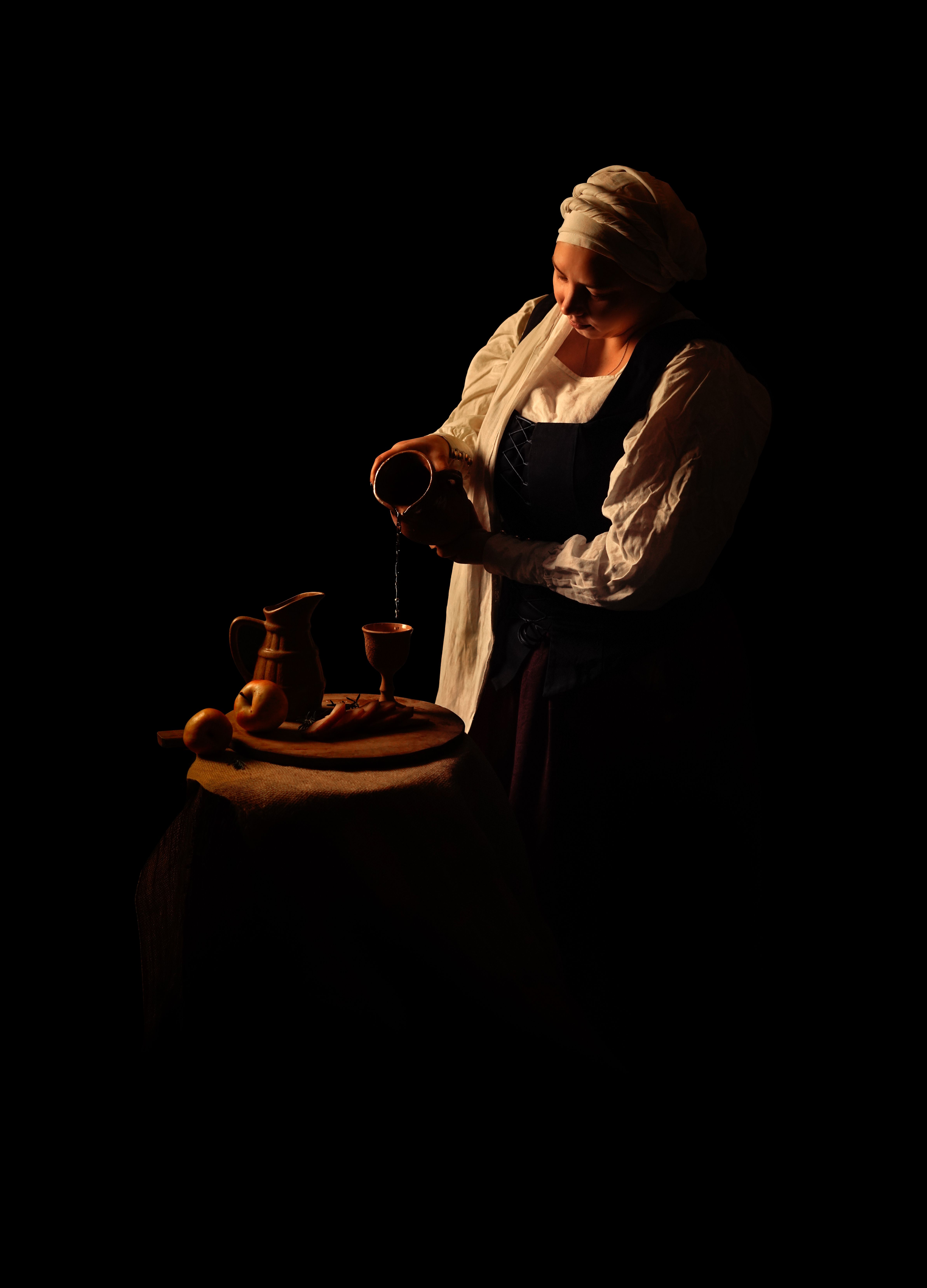 Medieval Maid Filling a Goblet · Free Stock Photo