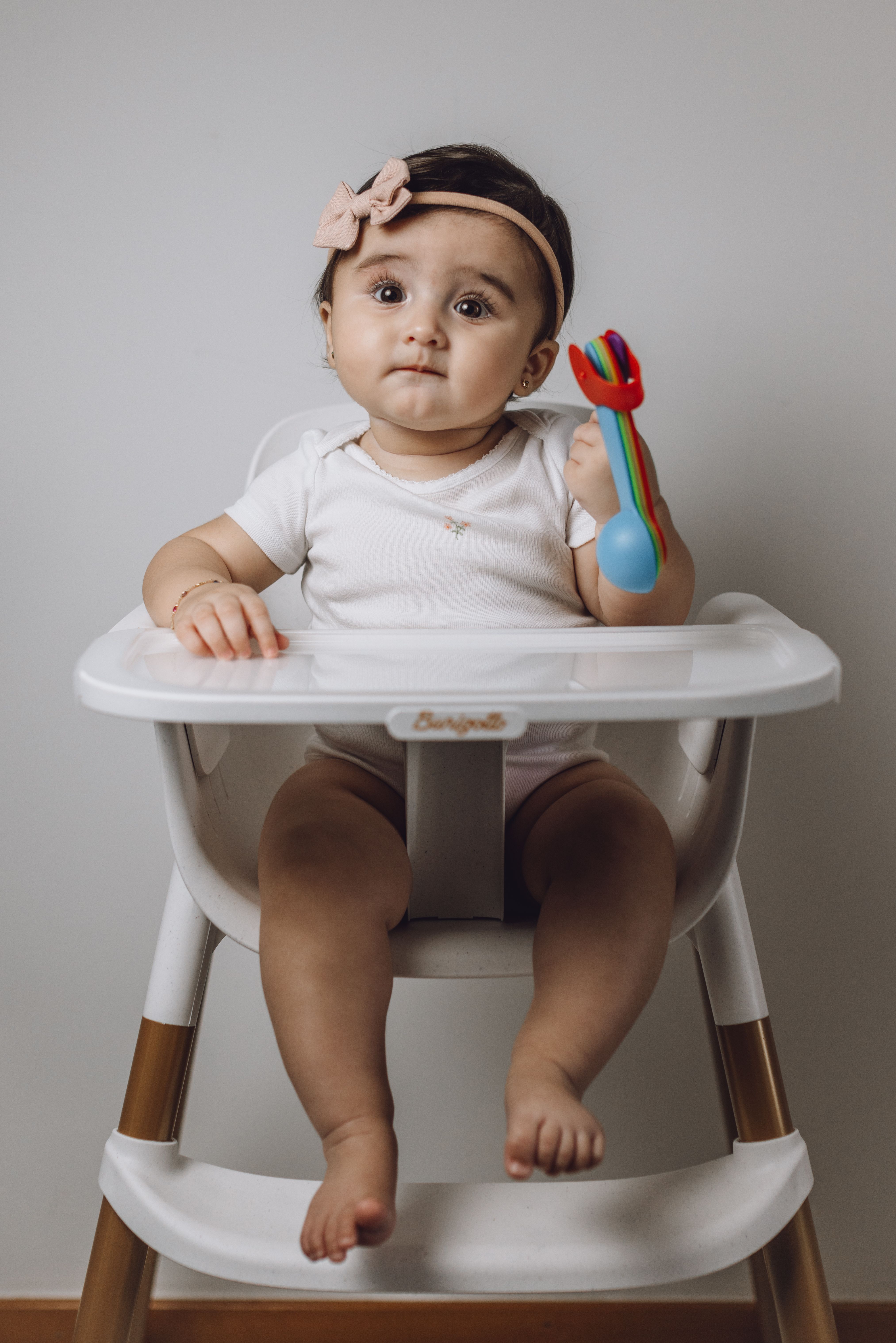 Girl Sitting on Baby Chair · Free Stock Photo