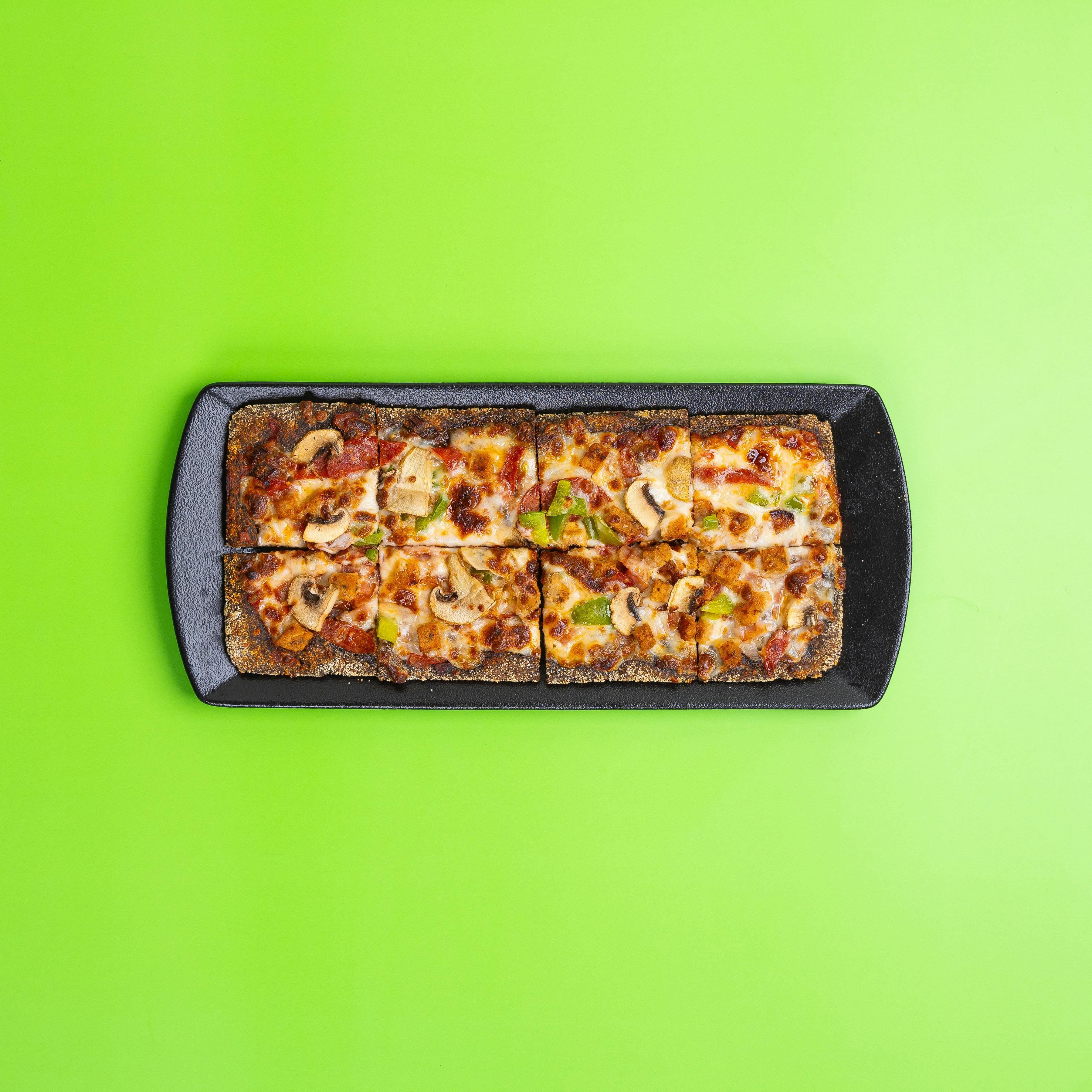 Square Pizza Slices on a Black Tray · Free Stock Photo