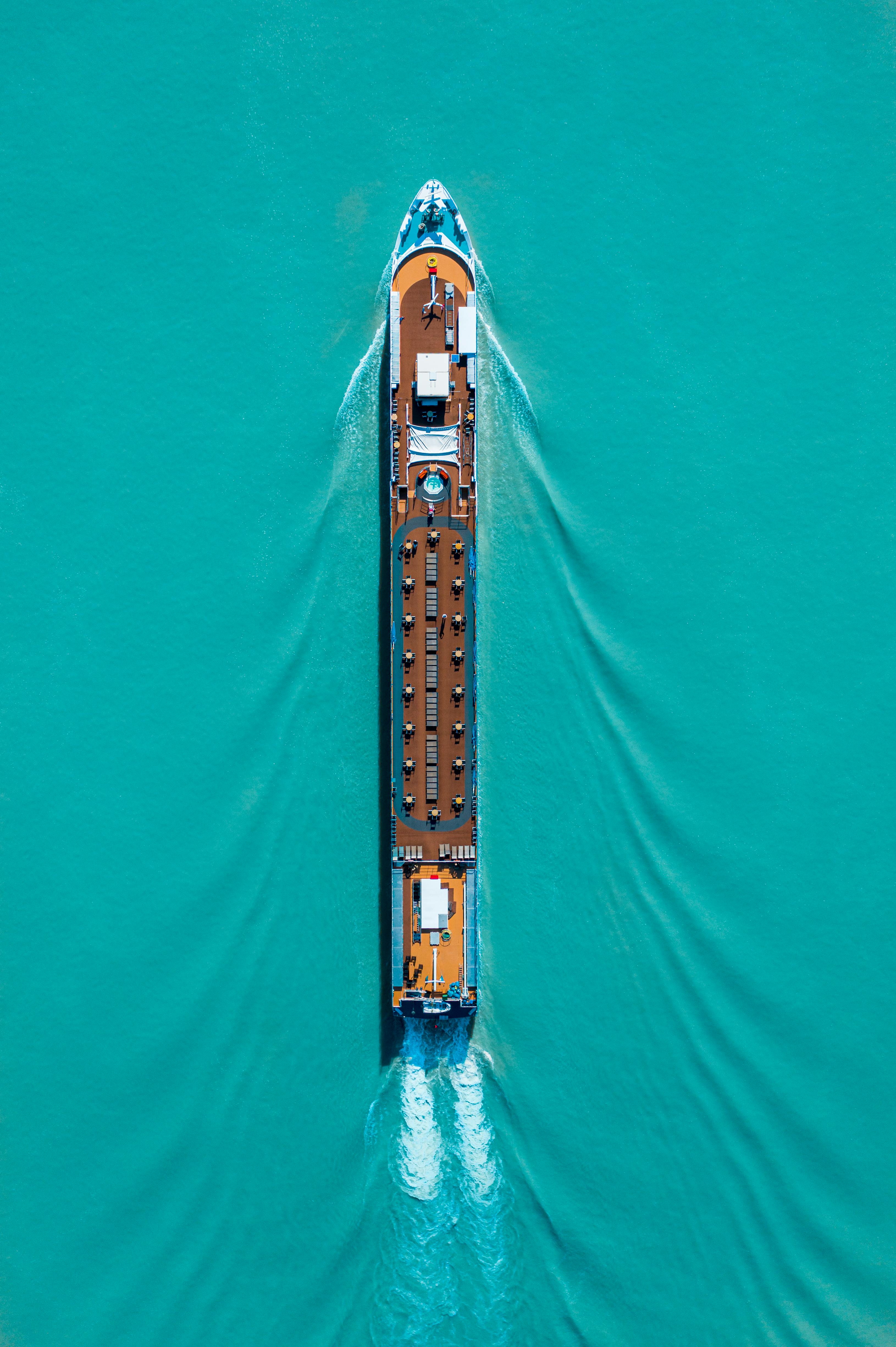 Top View Photo Of Boat On Sea · Free Stock Photo