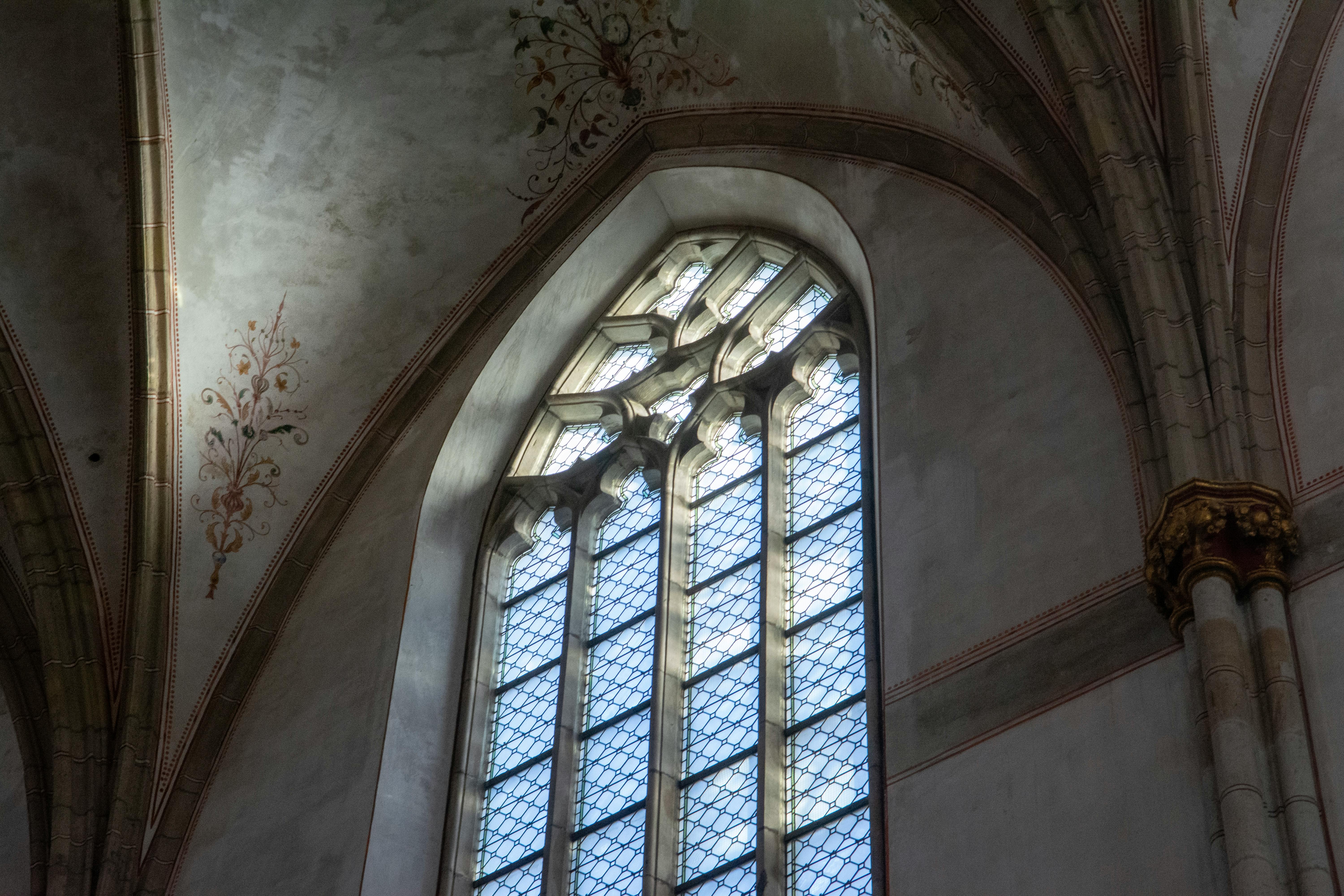 Decorated Rib Vault over a Church Window · Free Stock Photo