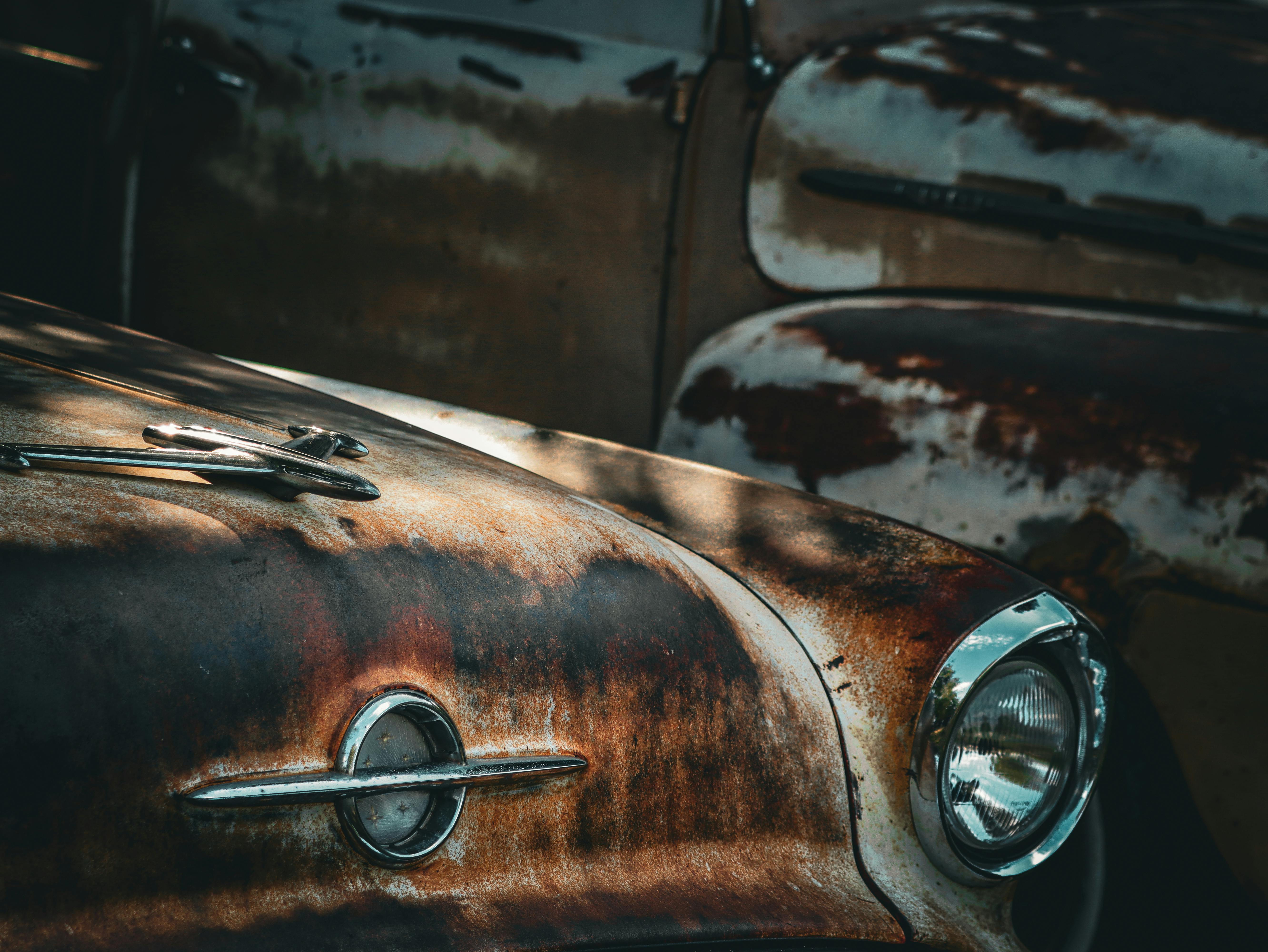 Close-up of Abandoned, Rusty Cars · Free Stock Photo