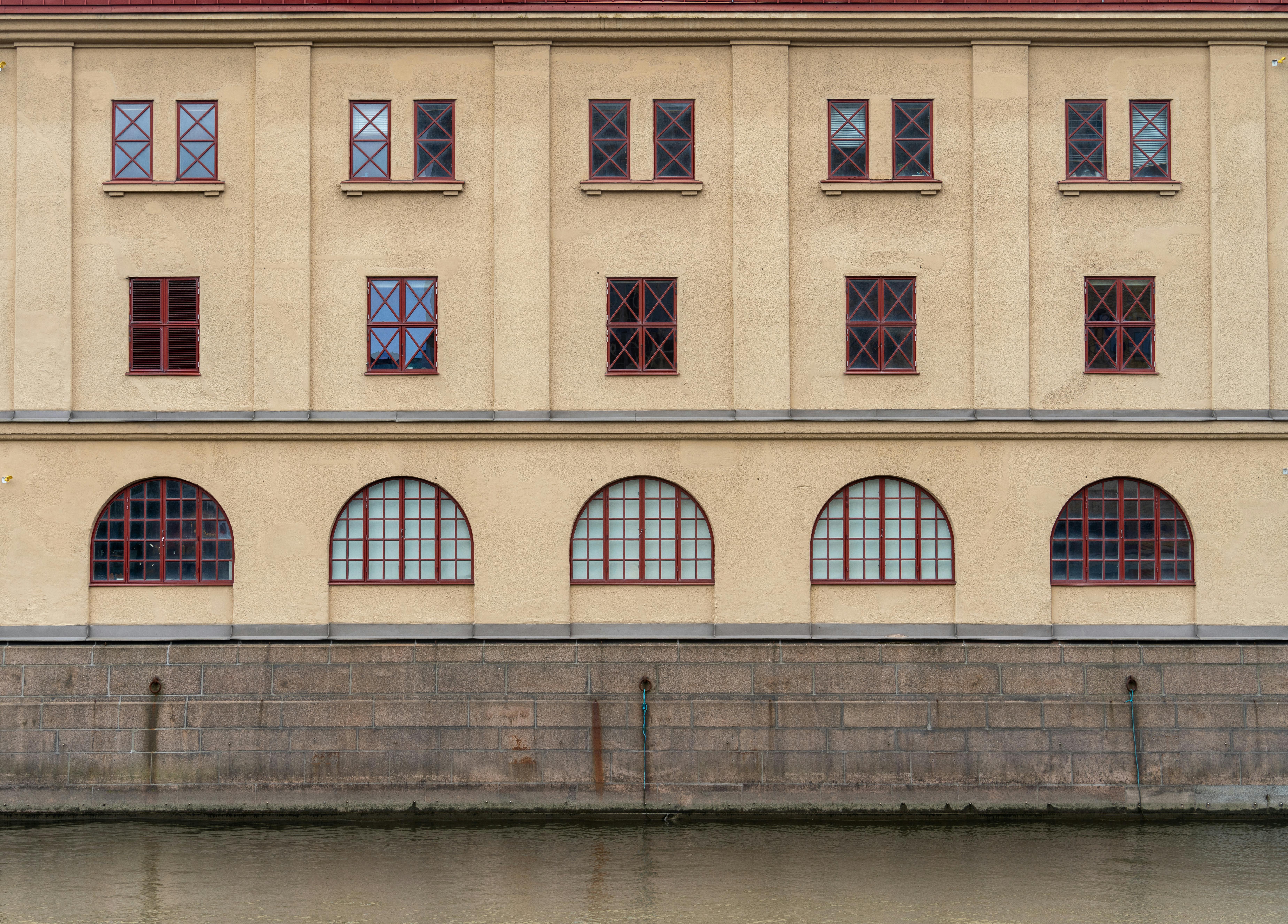 Windows in a Tenement by the Canal · Free Stock Photo