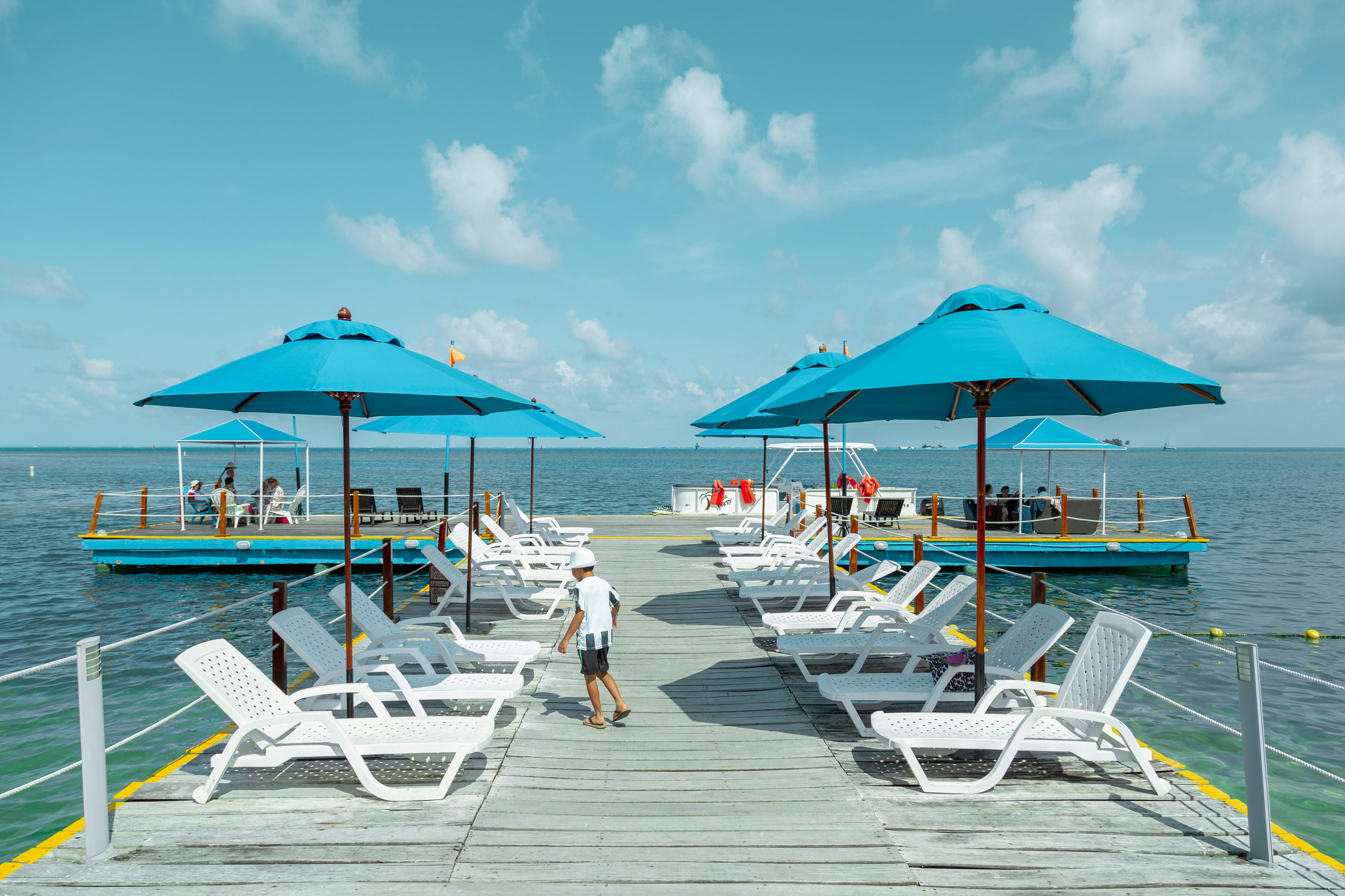 Beach Umbrellas and Chairs a Viewing deck · Free Stock Photo
