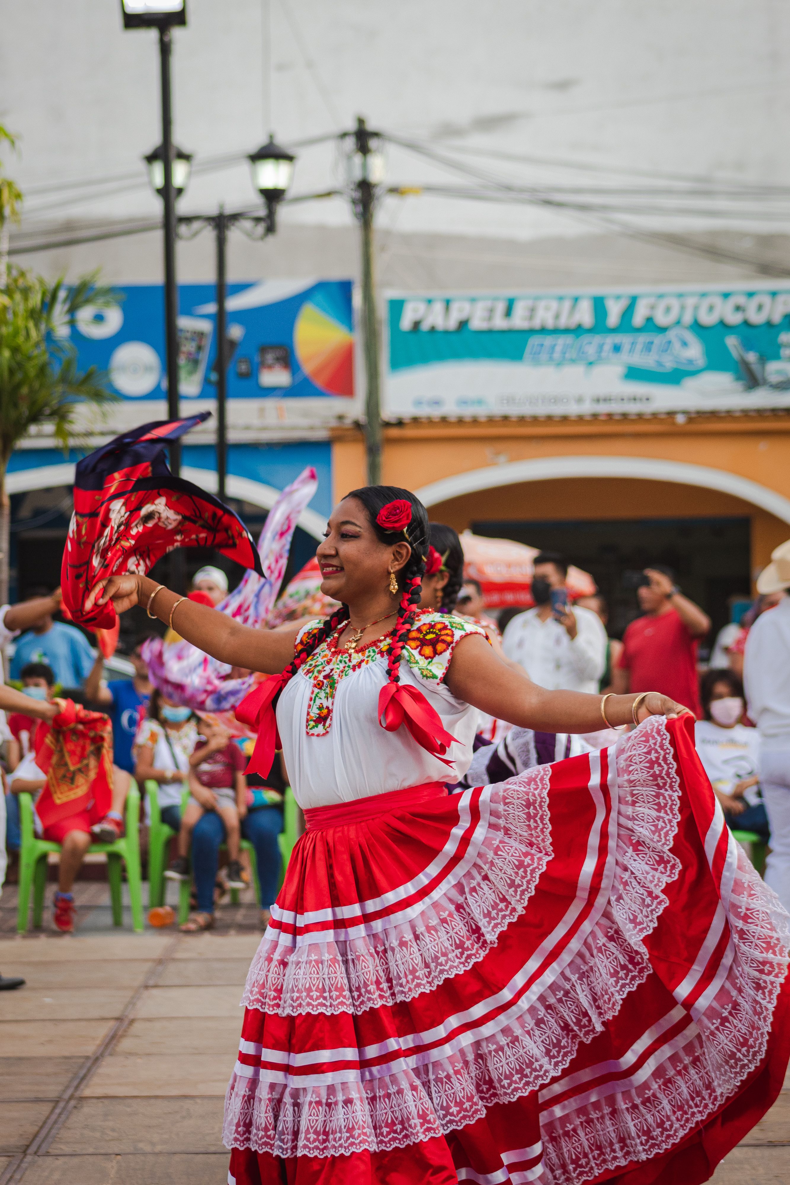 Woman Dancing in Traditional Mexican Floral Dress · Free Stock Photo