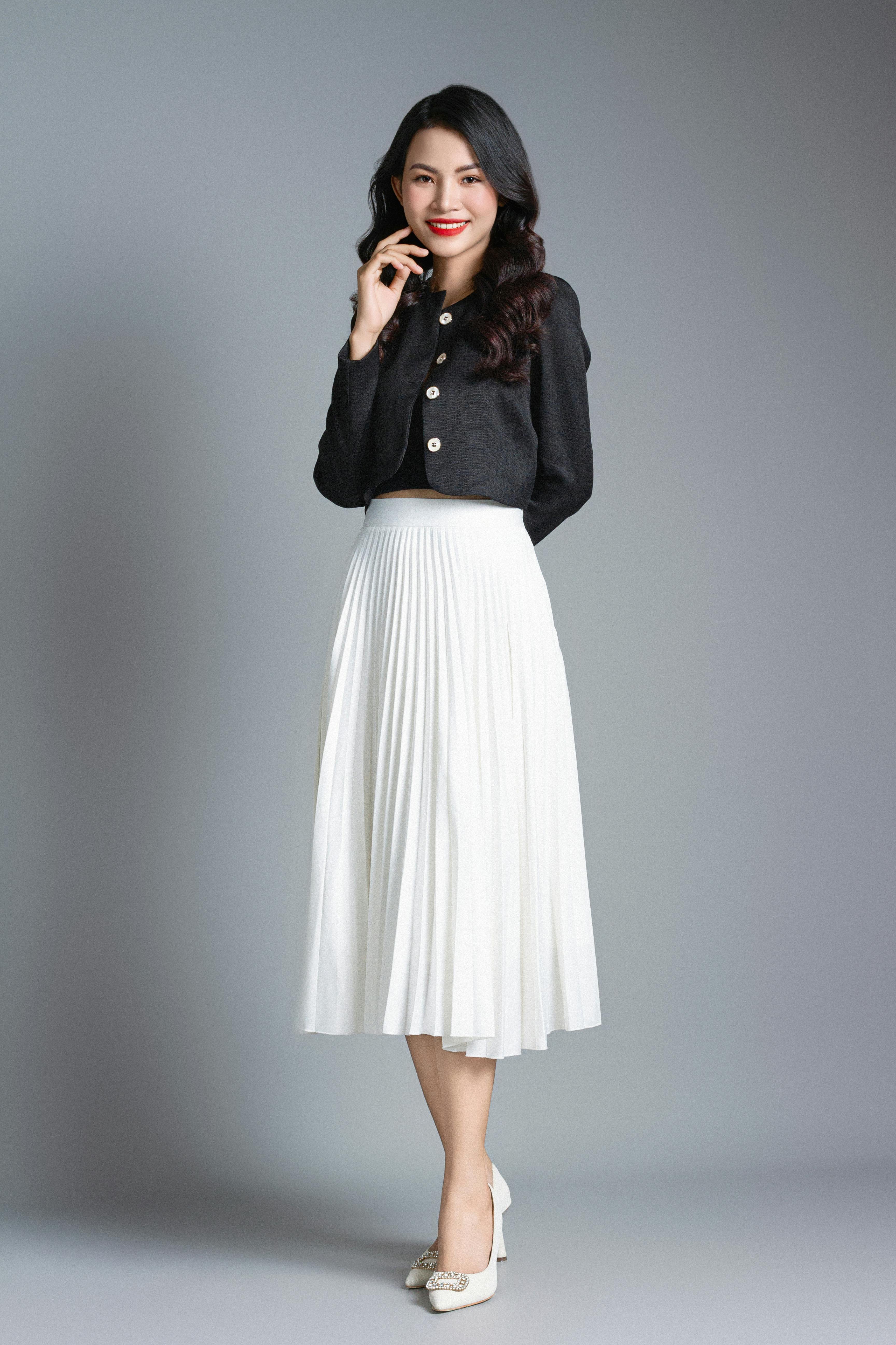 A Woman Posing in a Dress · Free Stock Photo