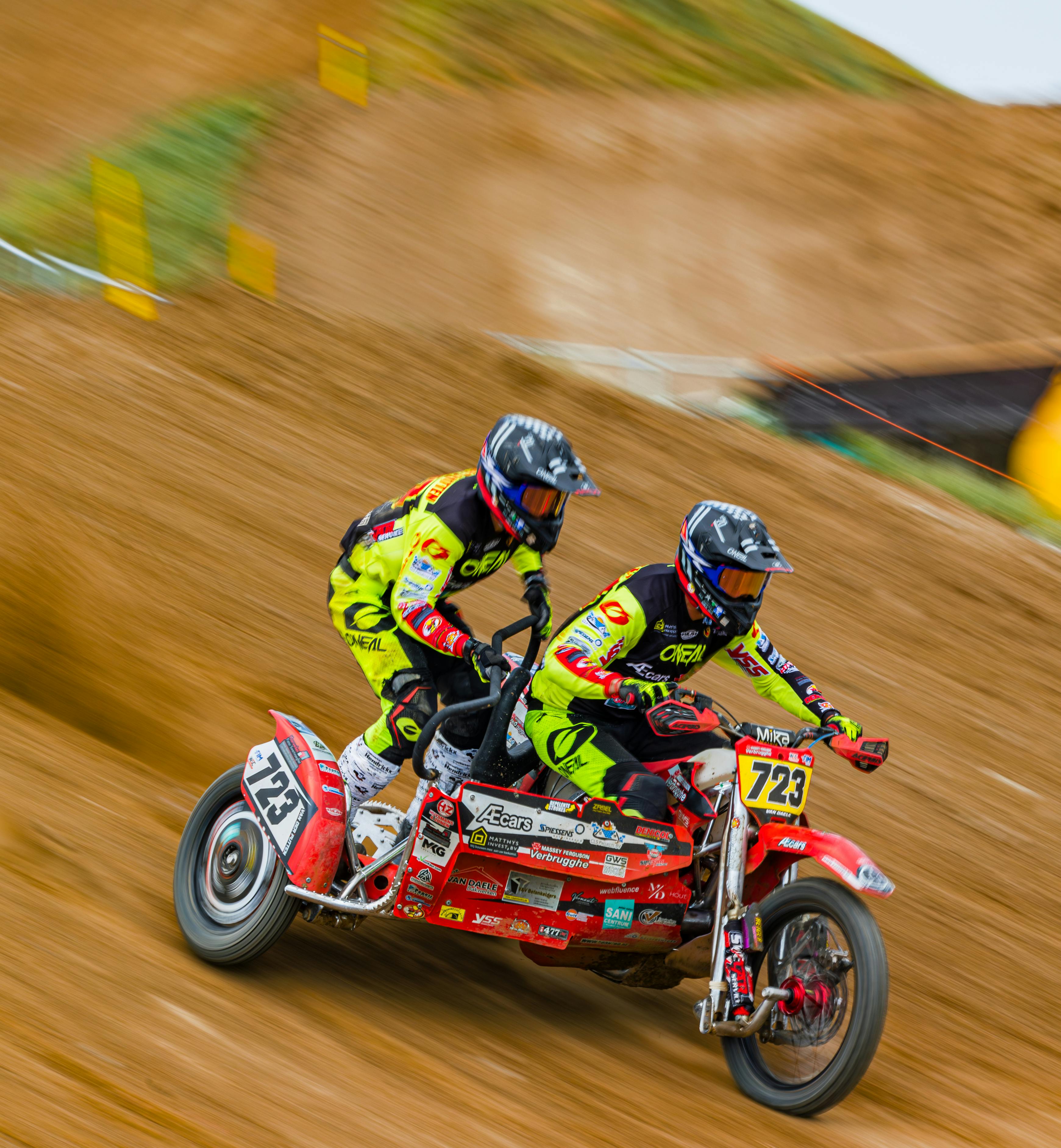 Sidecarcross Bikers Driving Downhill · Free Stock Photo
