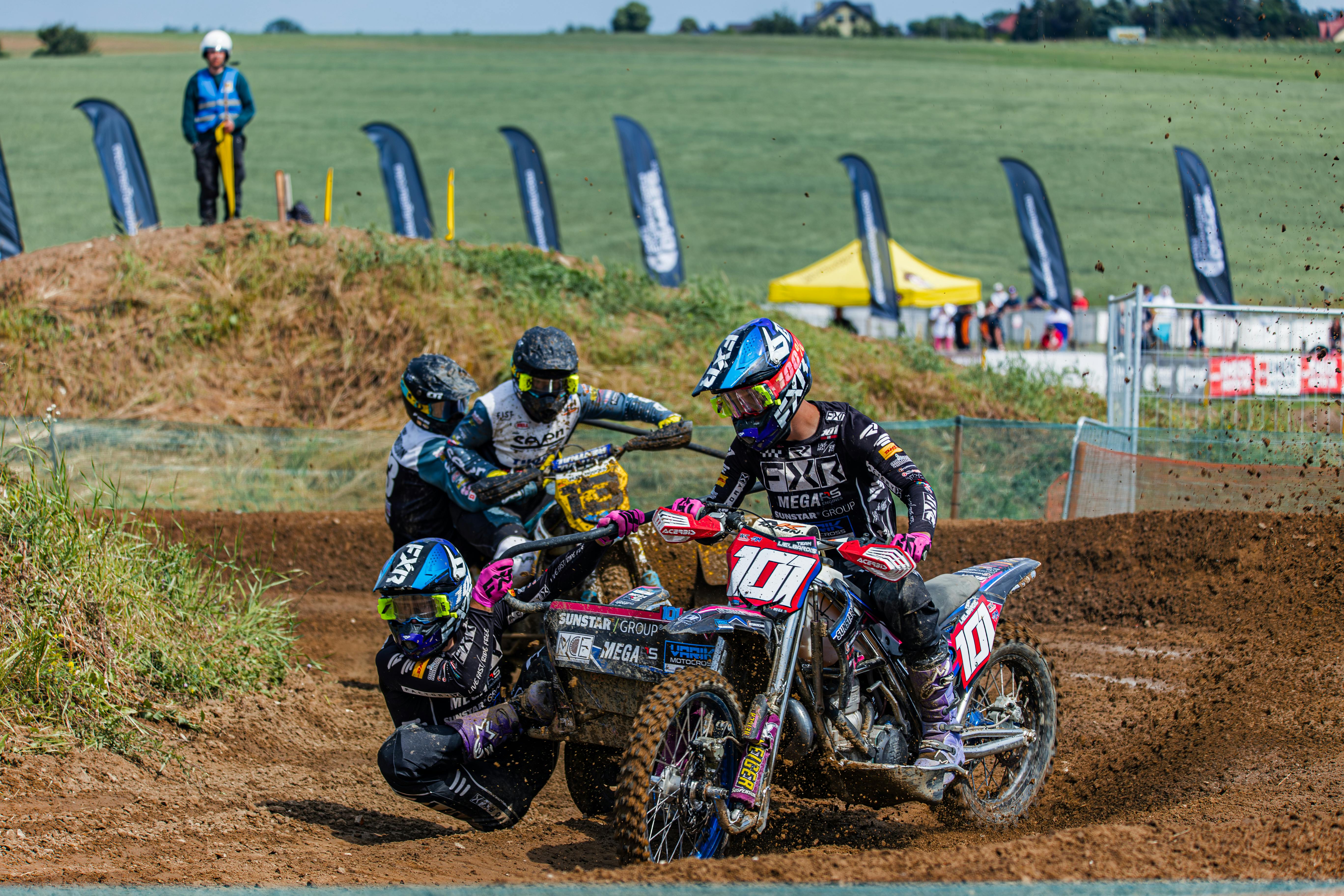 Sidecarcross Bikers Racing on Muddy Track · Free Stock Photo