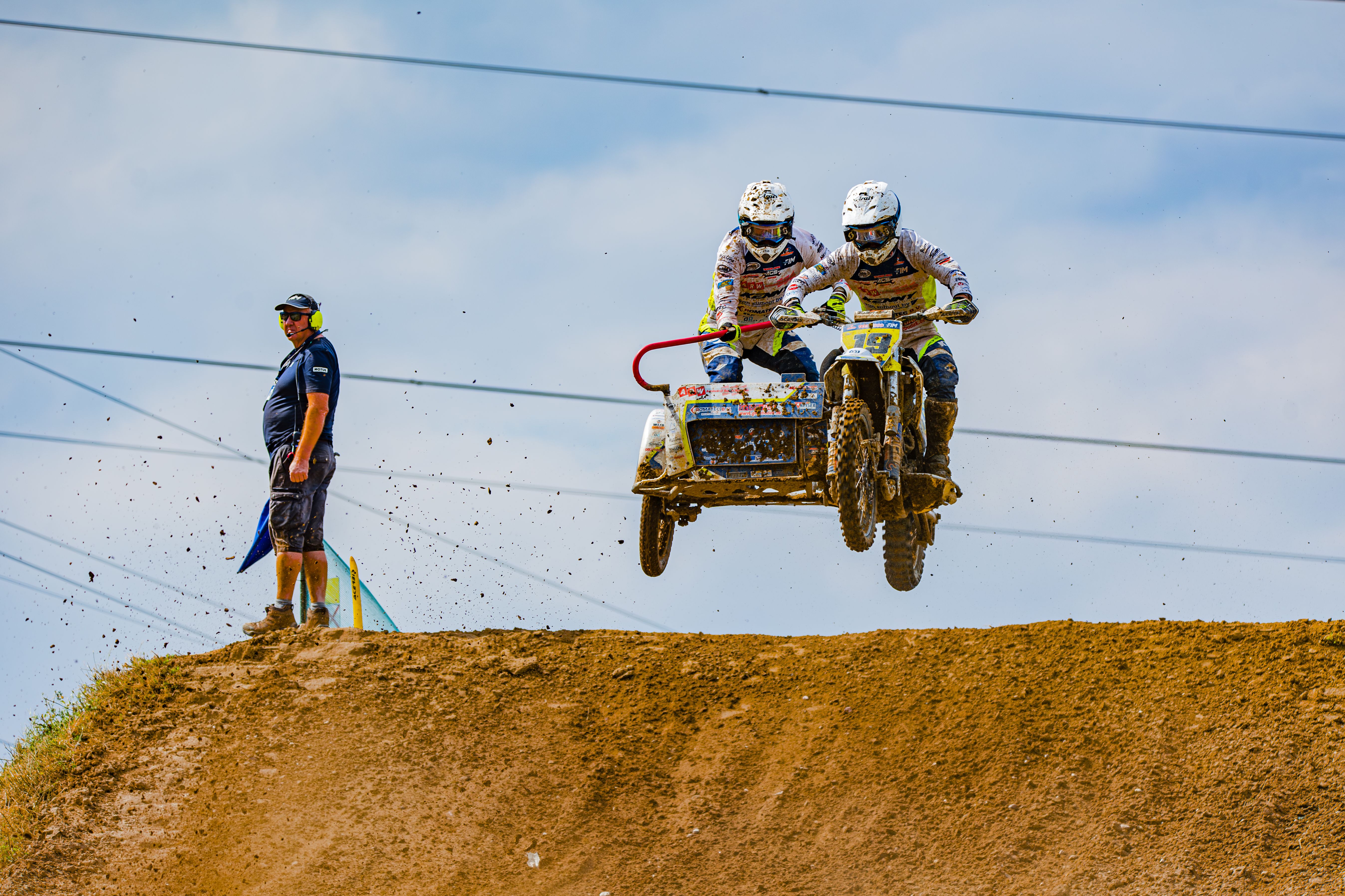 Man in White and Orange Motocross Overall Riding His Motocross Dirt ...