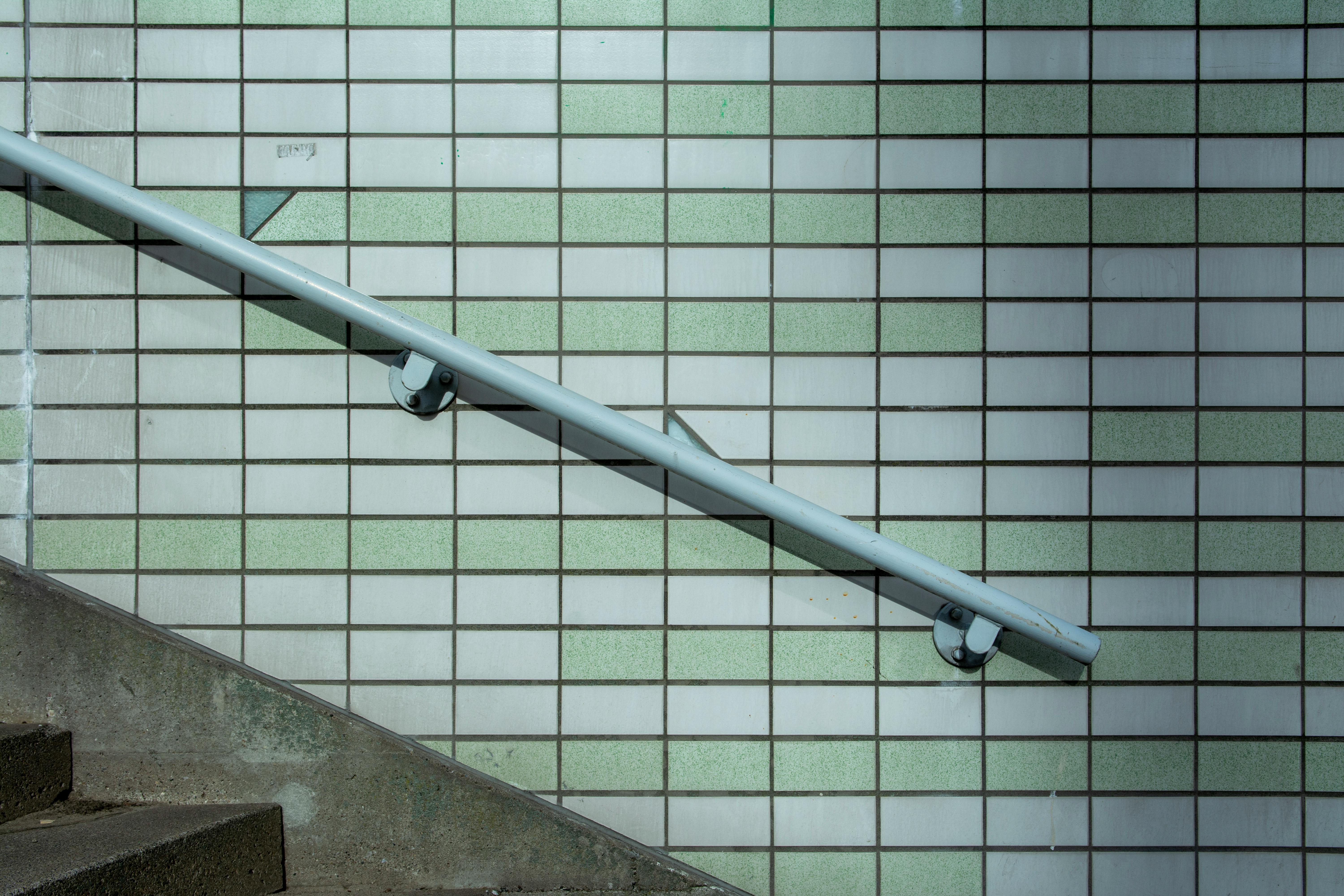 Close-up of the Handrail Attached to a Wall · Free Stock Photo