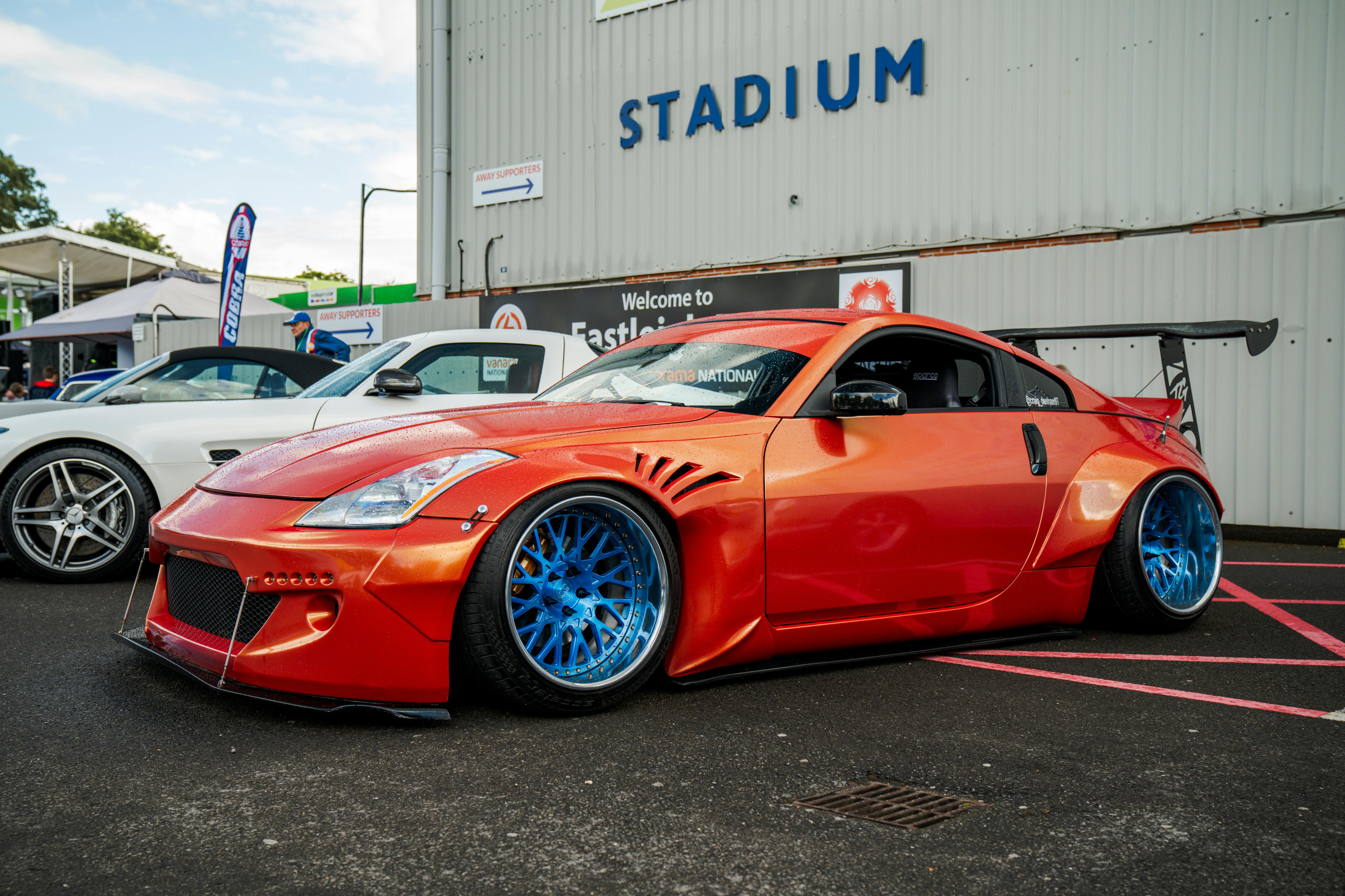 A Modified Nissan 350Z at a Car Show · Free Stock Photo
