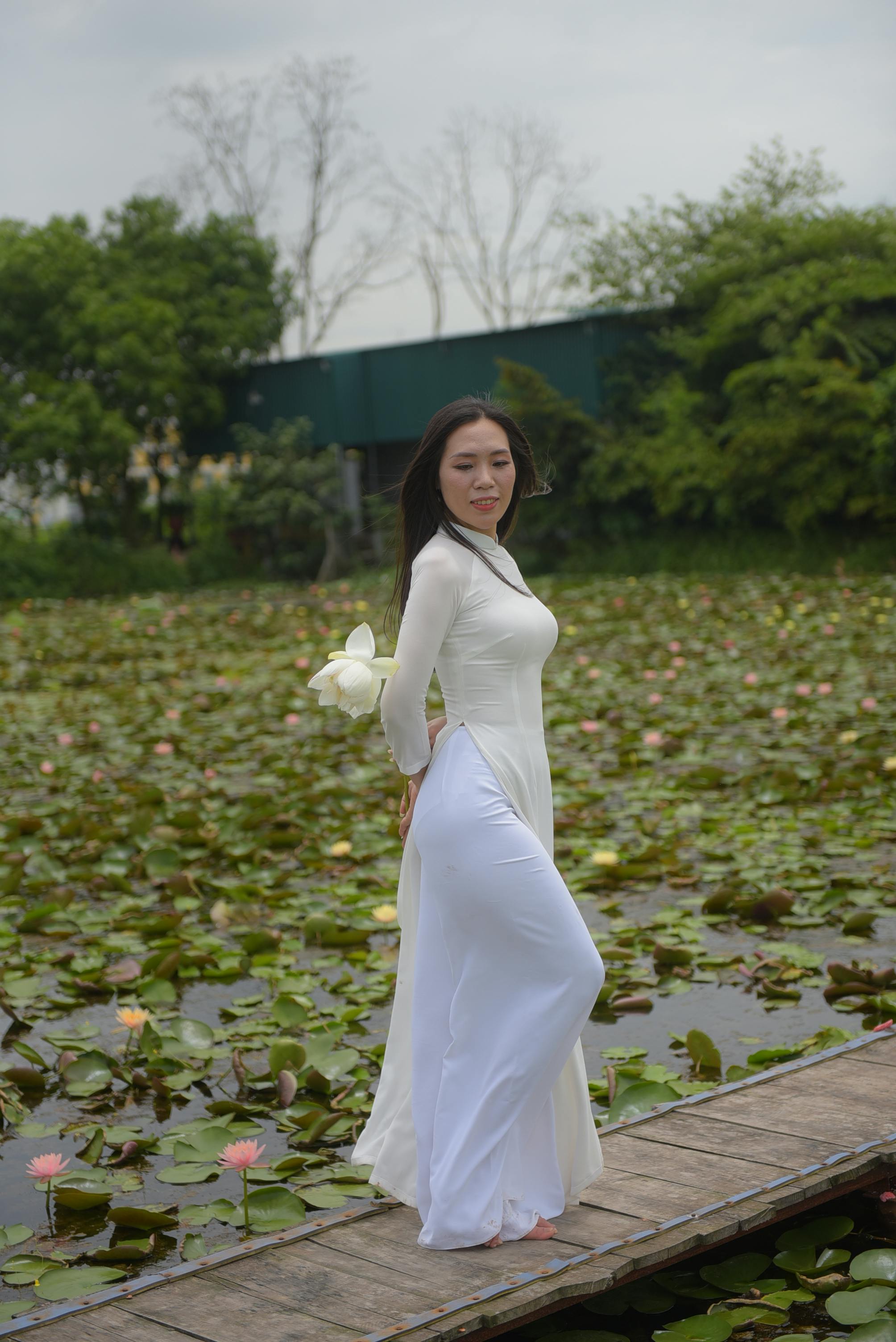 Woman Standing in White, Traditional Dress · Free Stock Photo
