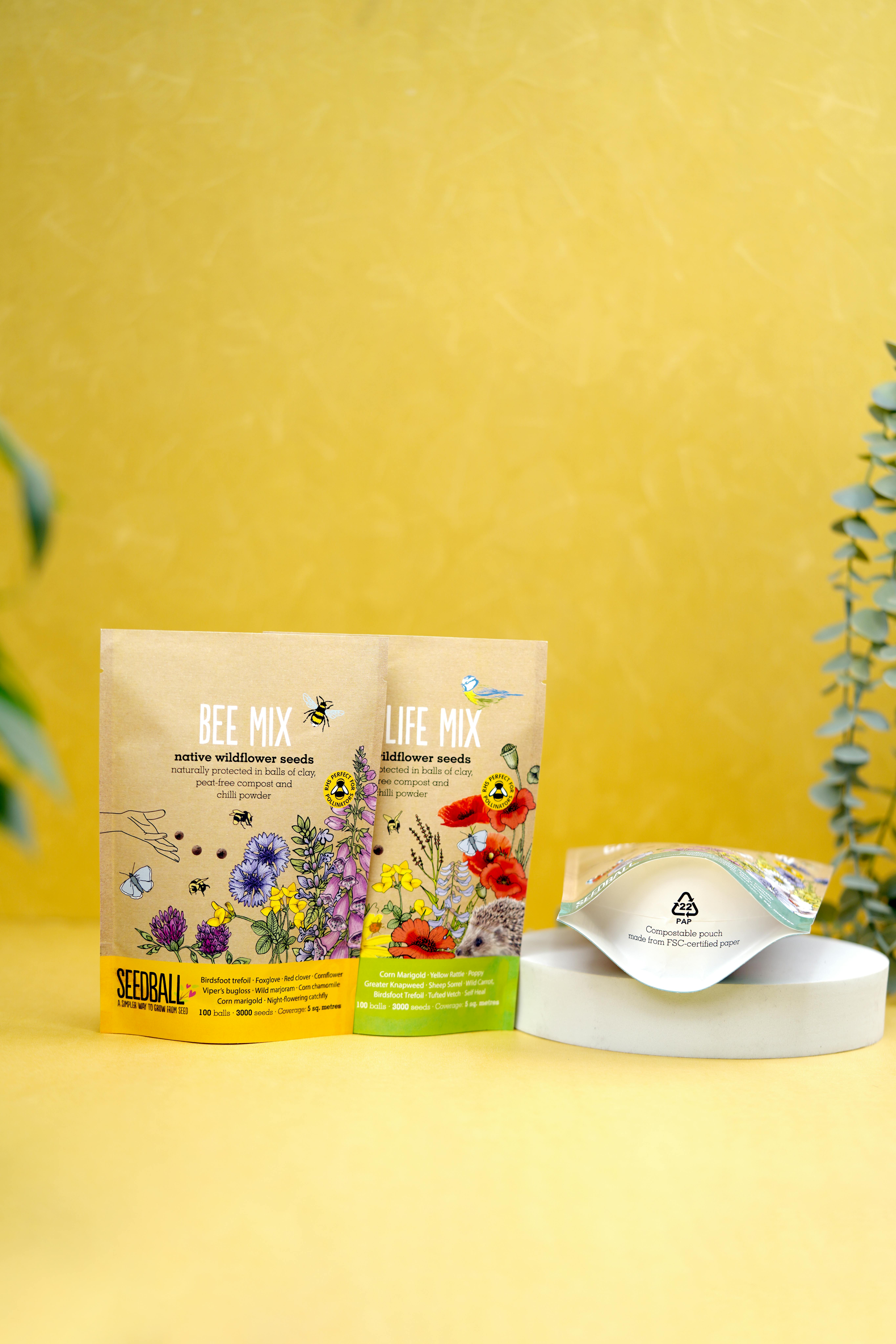 Bags with Wildflower Seed Mix against a Yellow Background · Free Stock ...