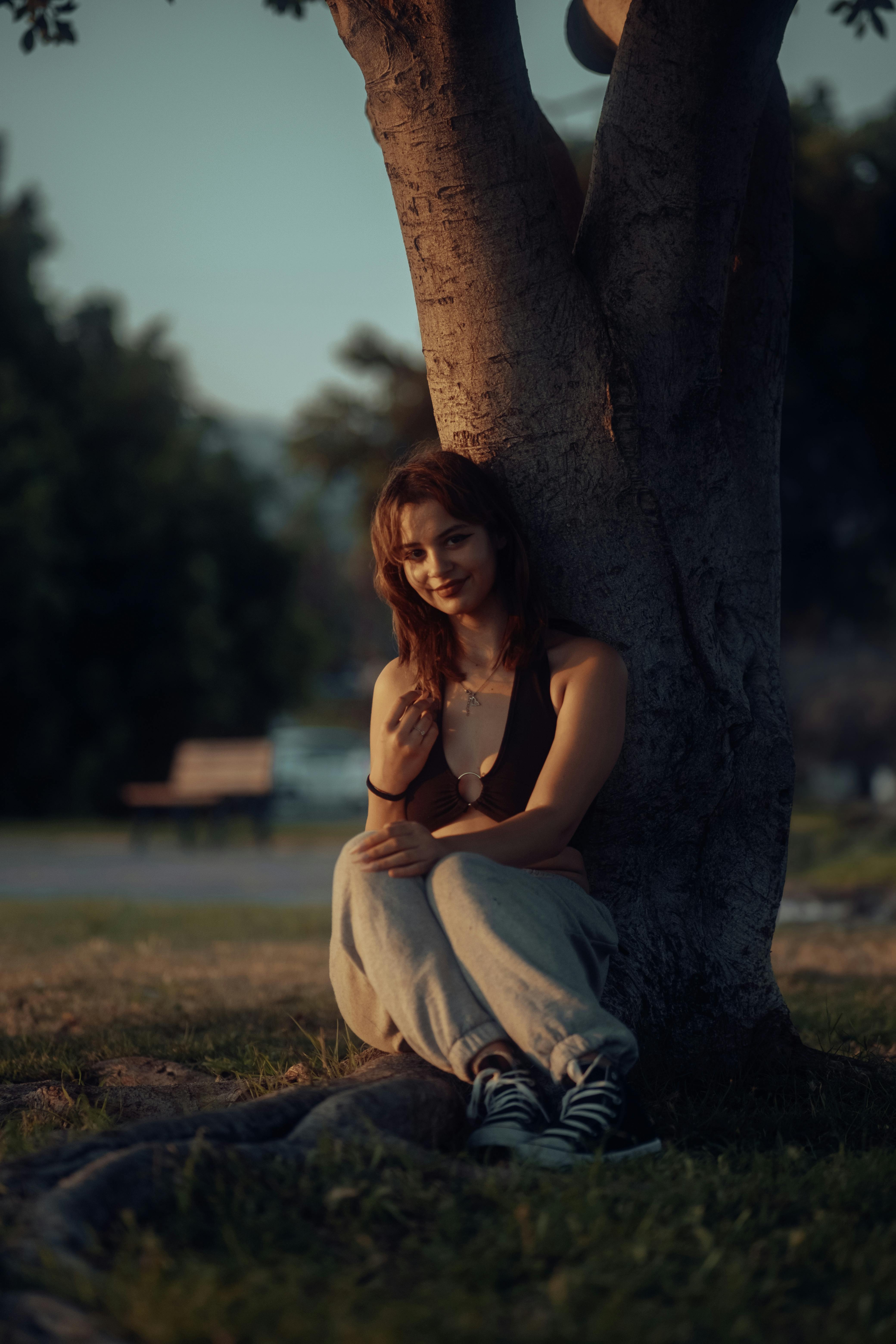 Woman Sitting under Tree at Park · Free Stock Photo