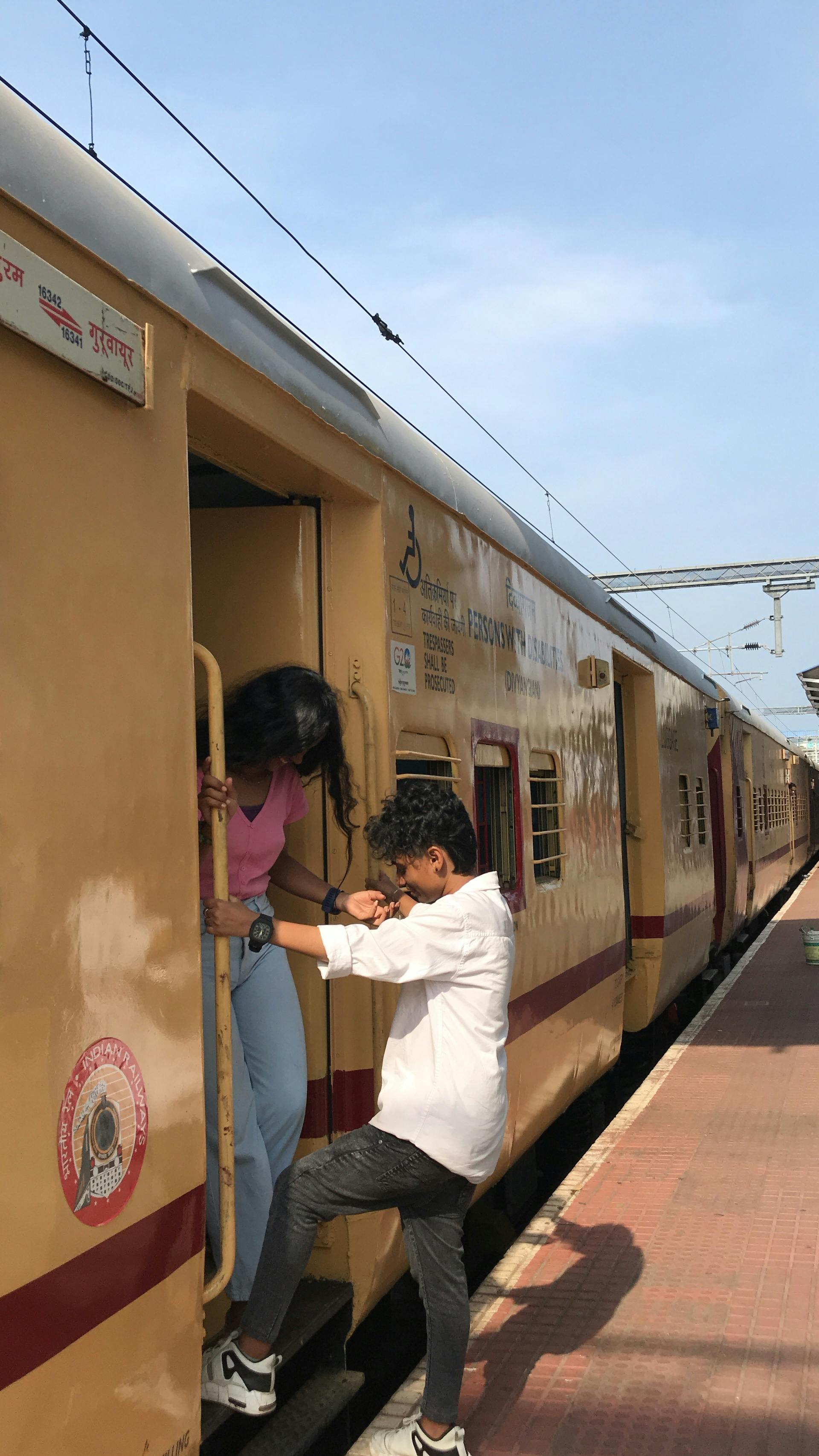 Couple Entering the Train · Free Stock Photo