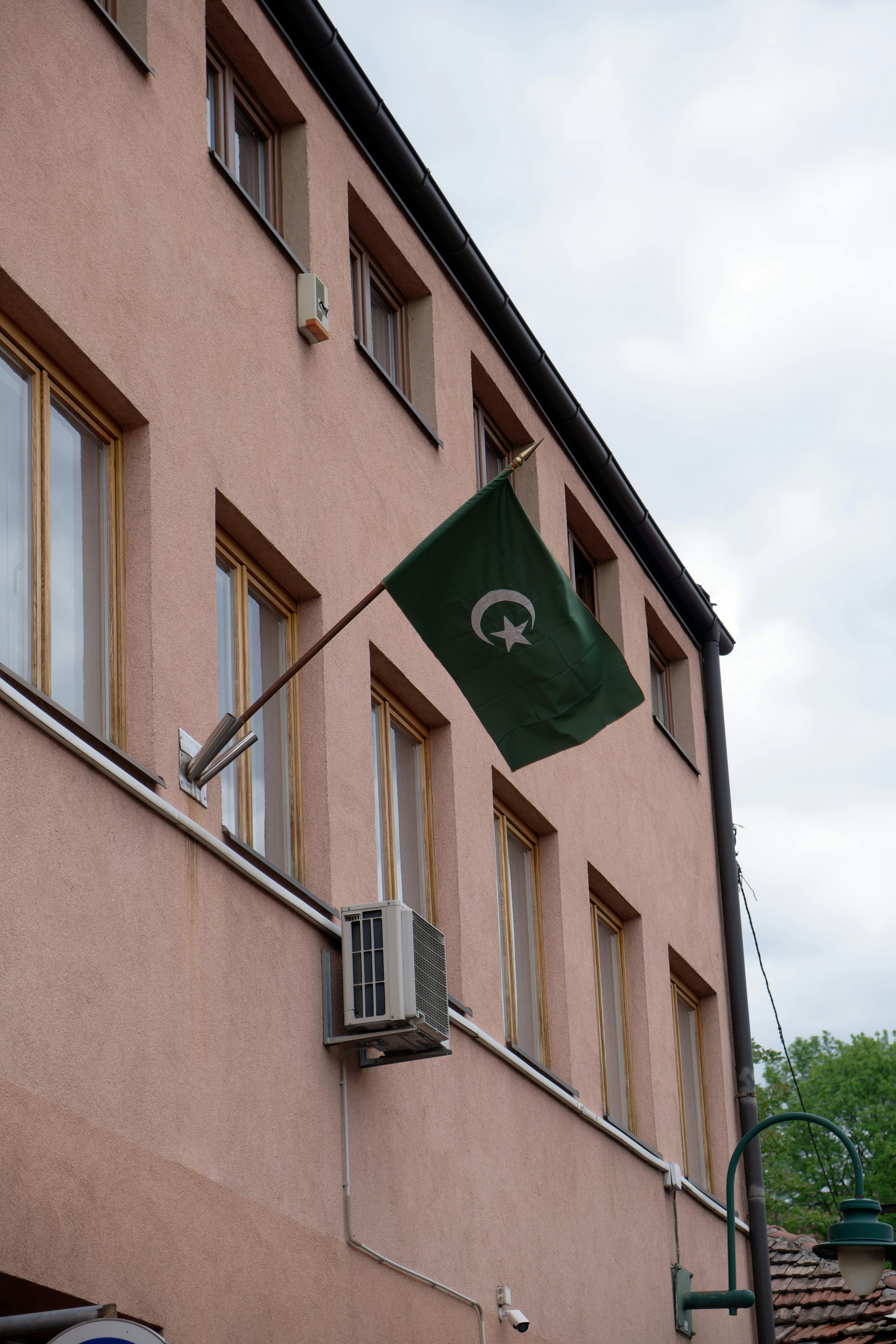 Flag of Pakistan on Building Wall · Free Stock Photo