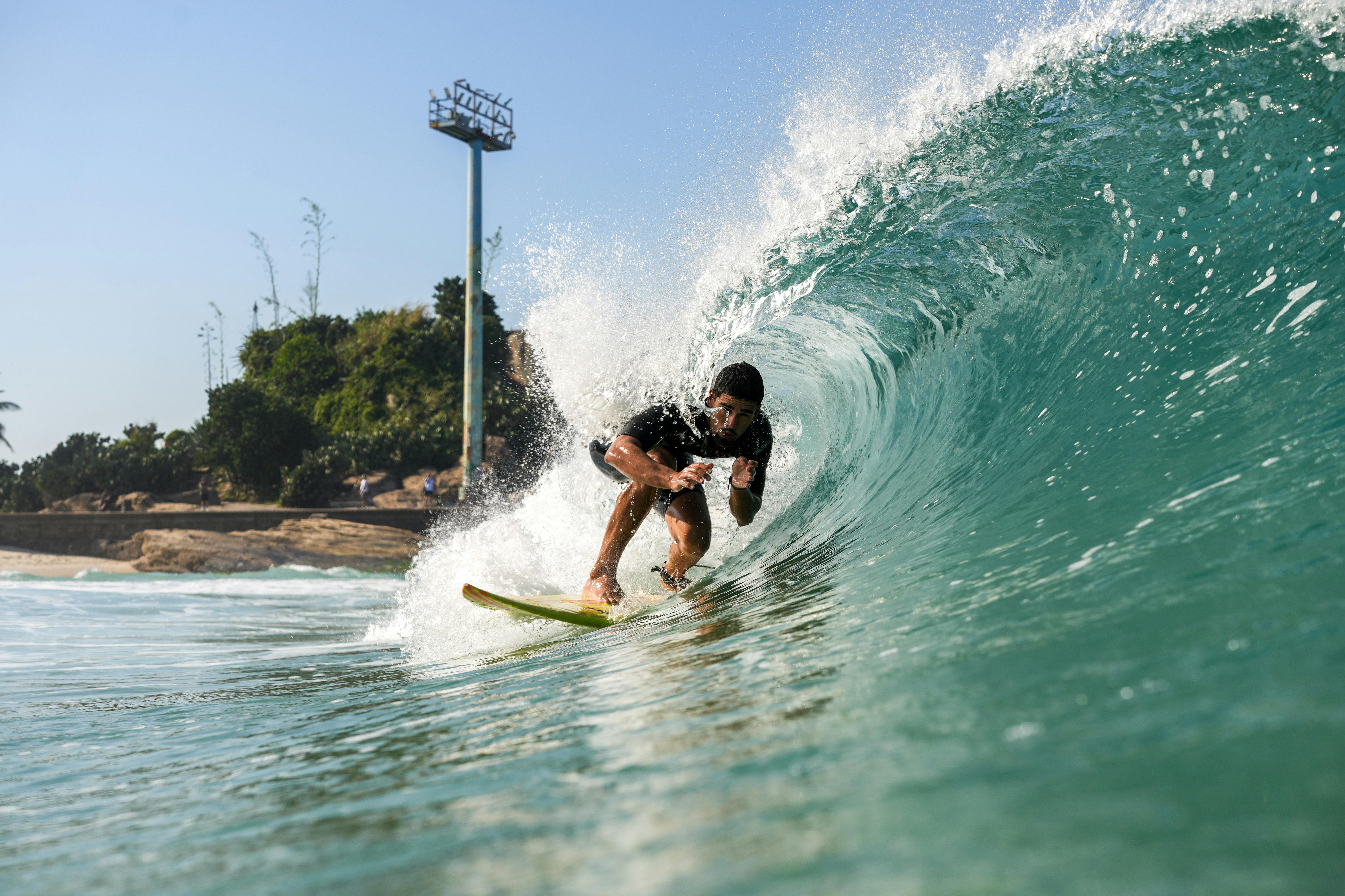 Surfer on Wave on Sea Shore · Free Stock Photo