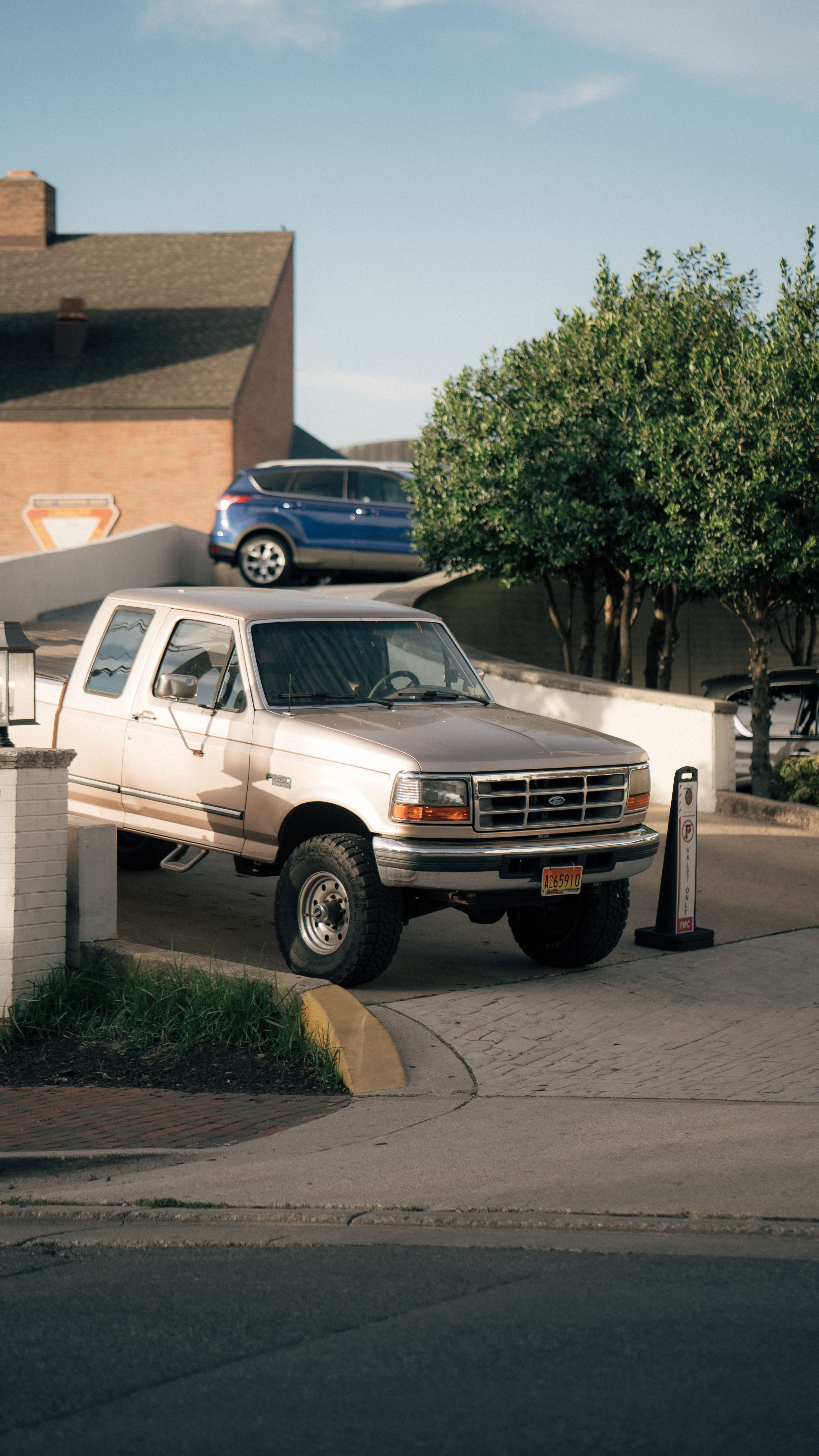 White Ford Parked on a Street · Free Stock Photo