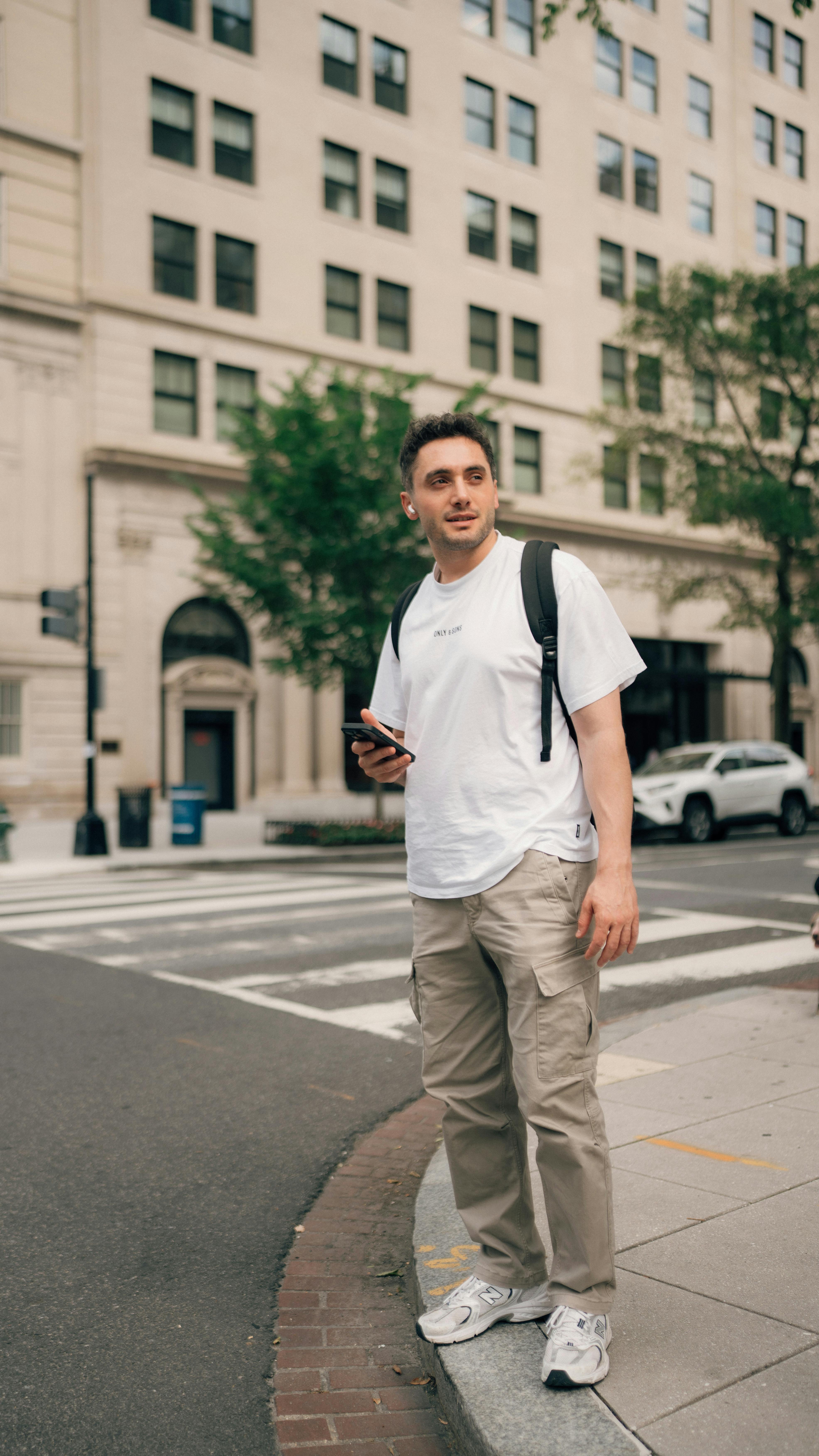 Man Standing On Edge Photos, Download The BEST Free Man Standing On ...