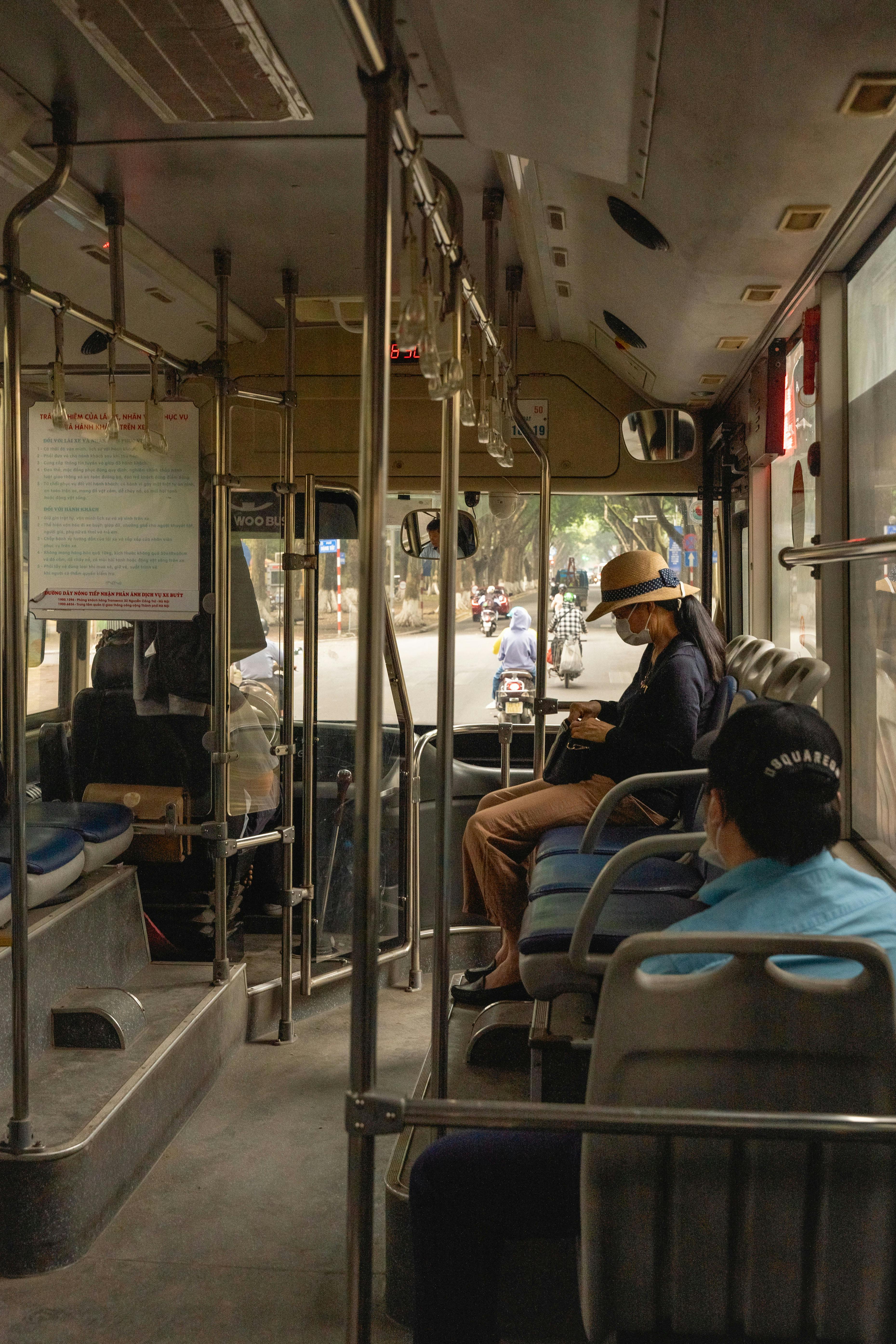 Woman Standing in Bus · Free Stock Photo