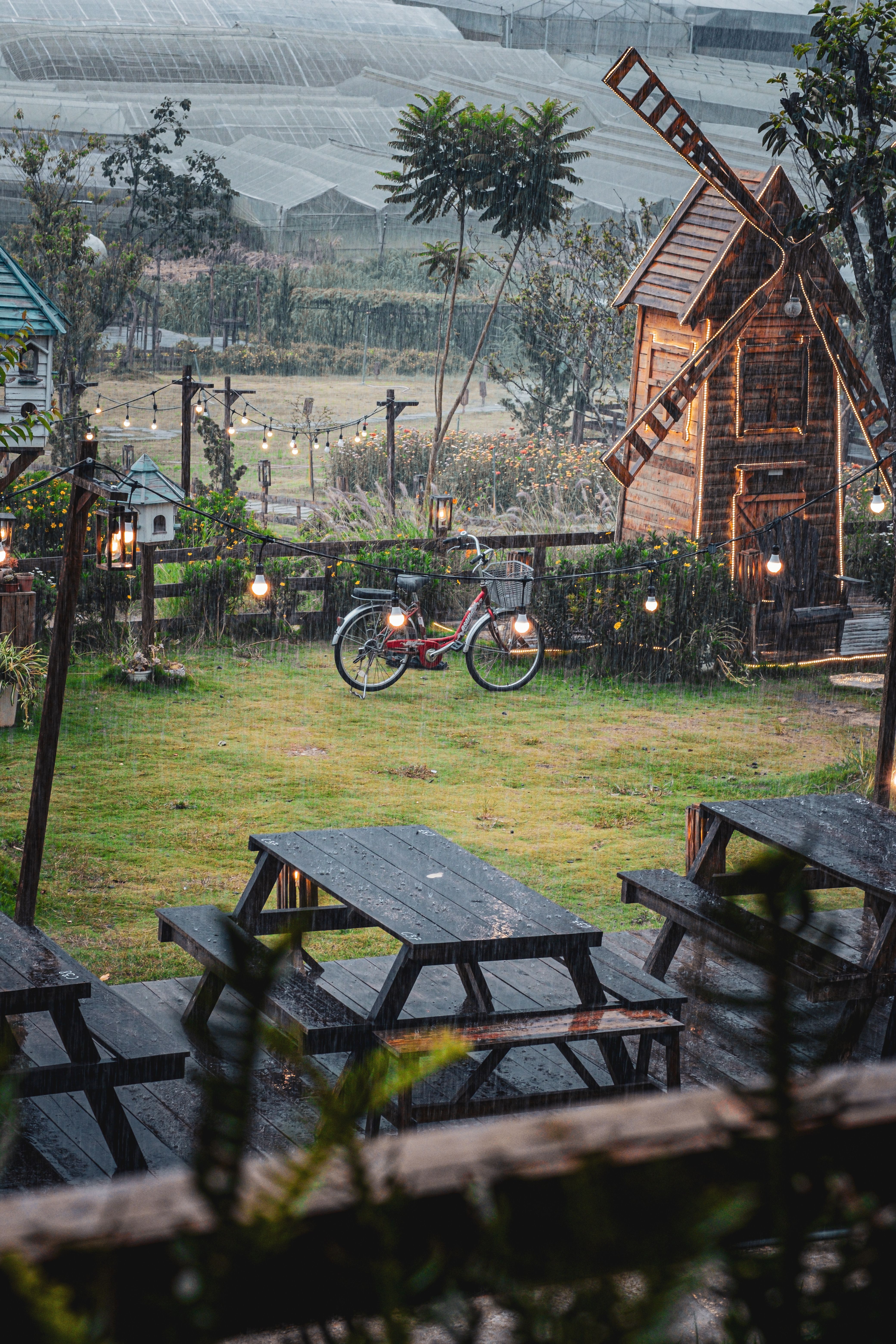 Bicycle and a Windmill in a Park · Free Stock Photo