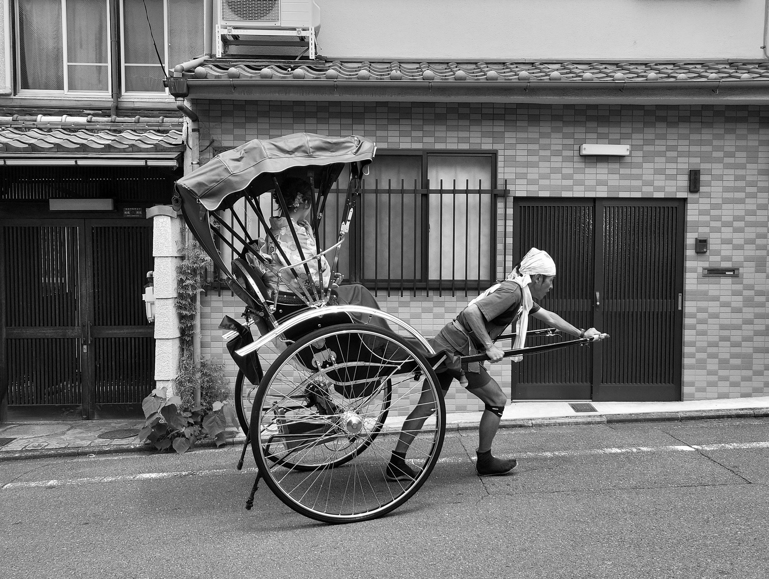 Man Walking with Rickshaw on Street · Free Stock Photo