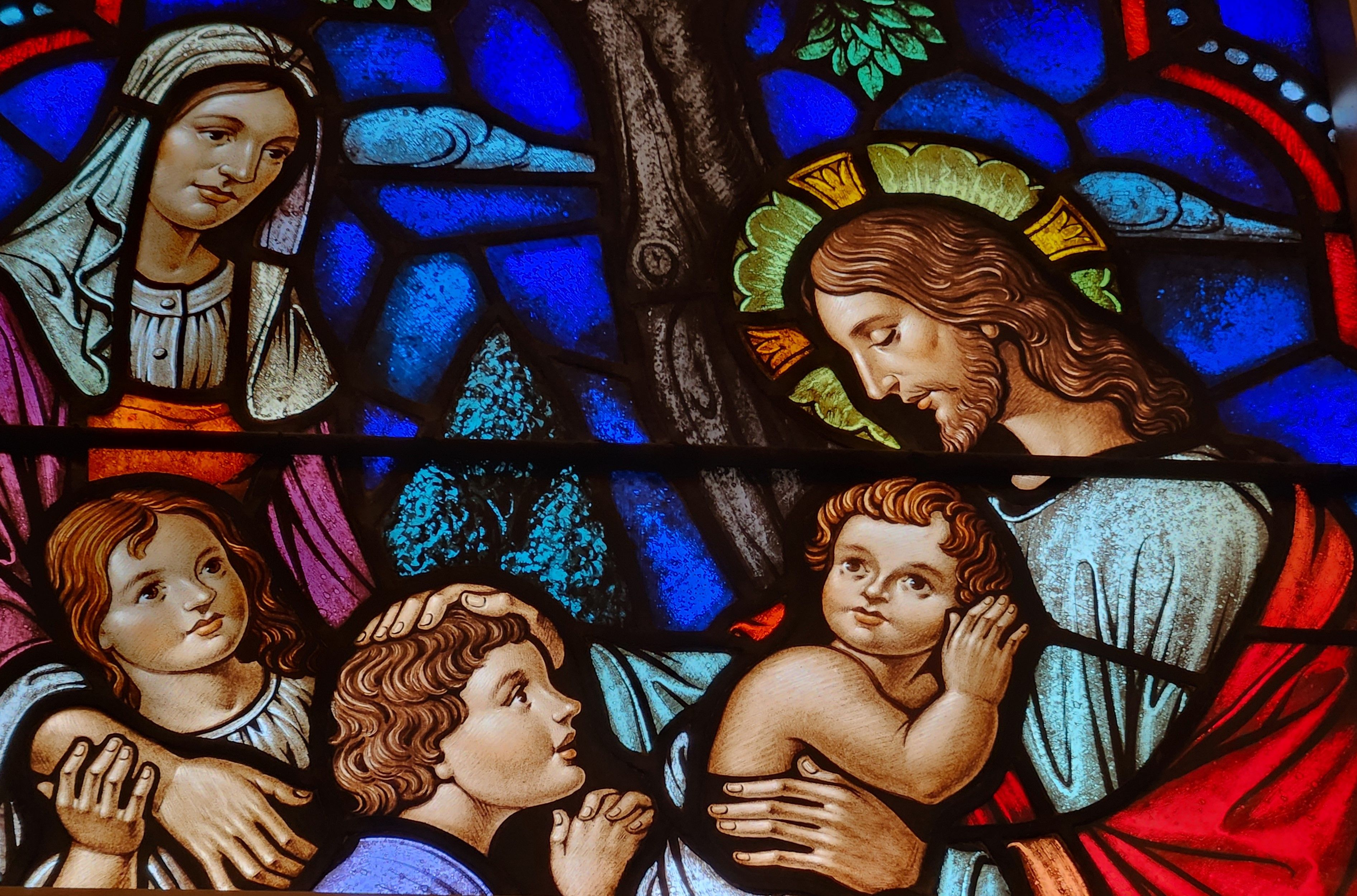 Stained Glass Window with Religious Theme · Free Stock Photo