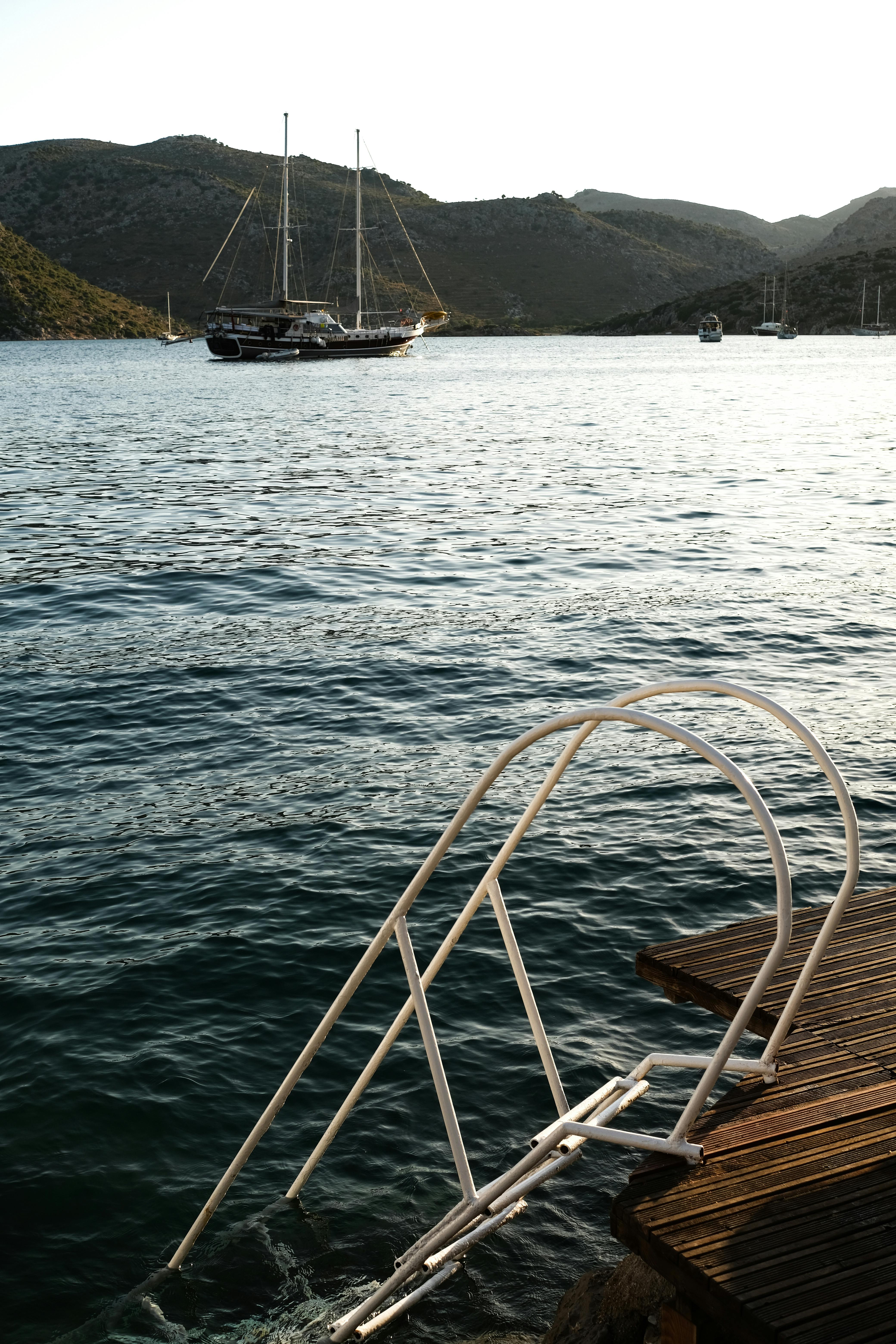 Ladder on Pier on Seashore · Free Stock Photo