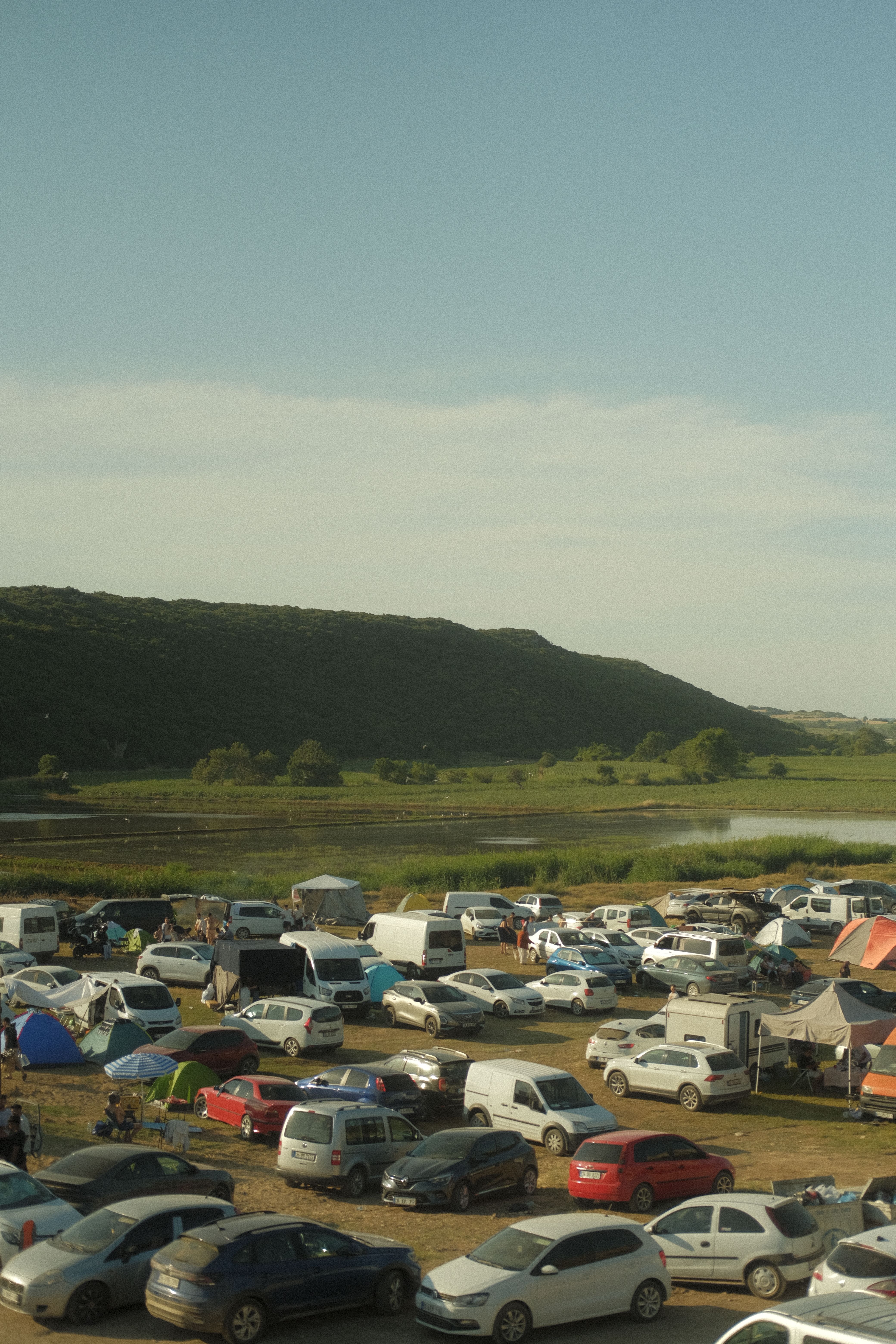Cars on a Parking Lot in a Valley · Free Stock Photo
