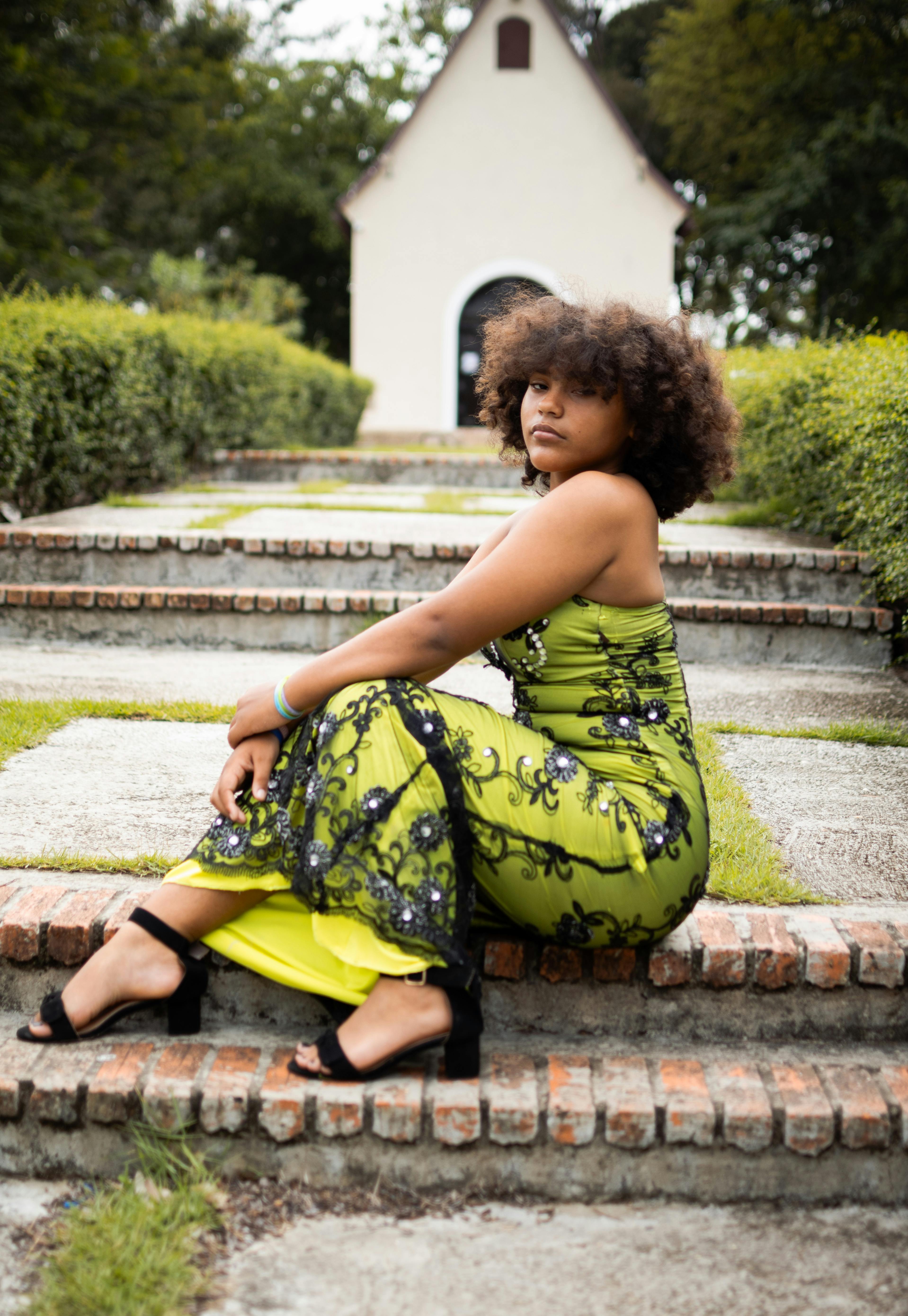 Woman Sitting in Dress on Stairs · Free Stock Photo