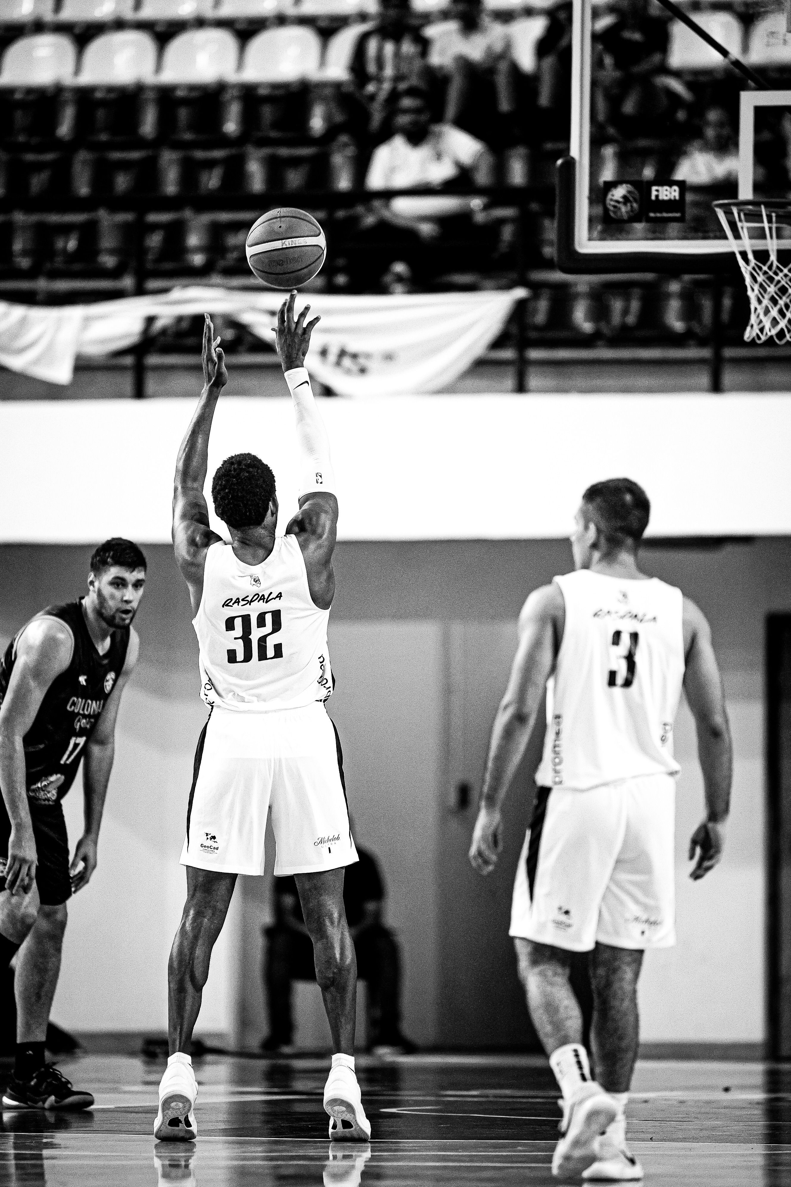 Back View of Sportsmen Playing Basketball · Free Stock Photo