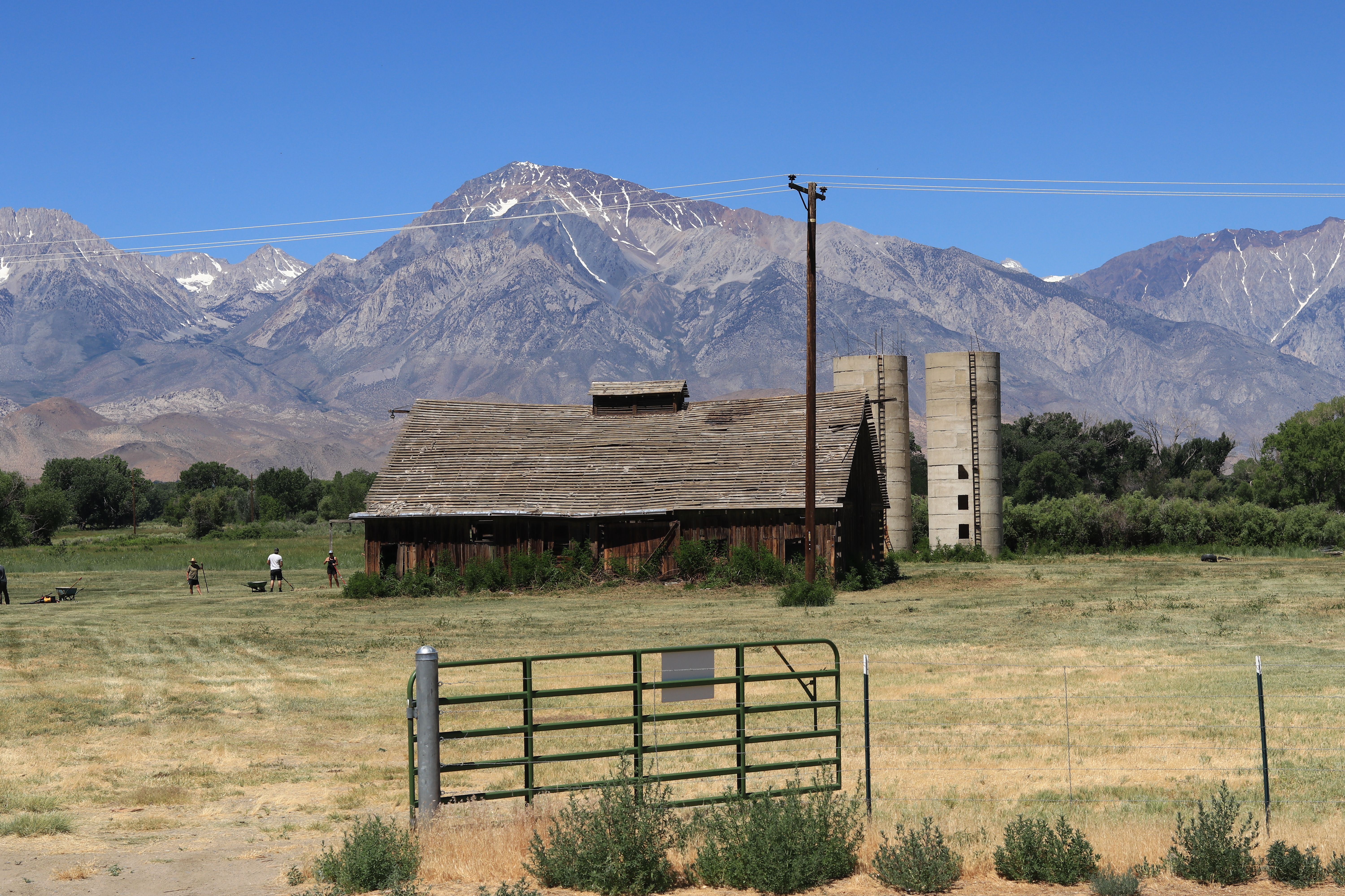 View of a Wooden Building in the Mountain Valley · Free Stock Photo