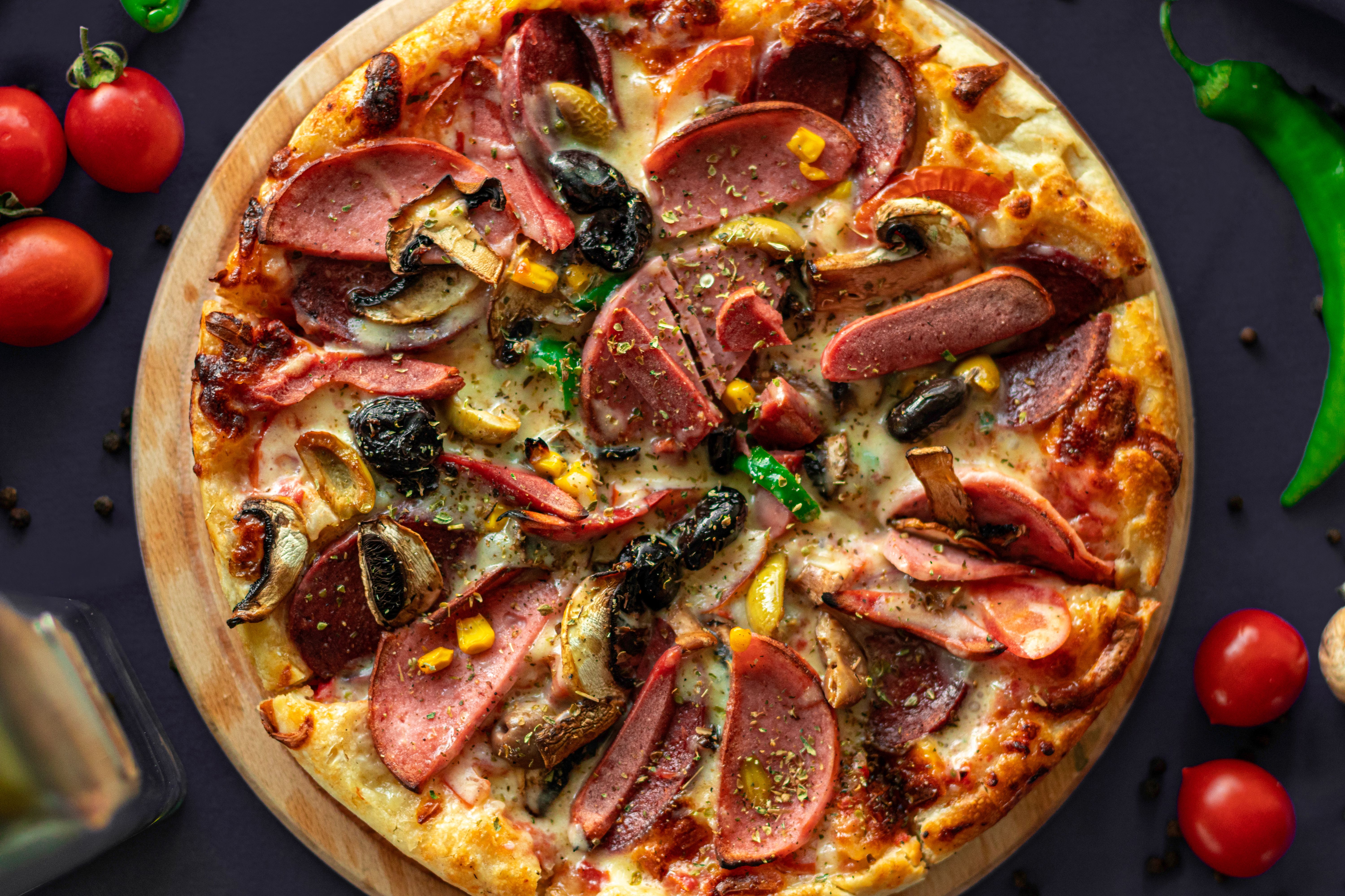 Pizza with Meat and Vegetables · Free Stock Photo