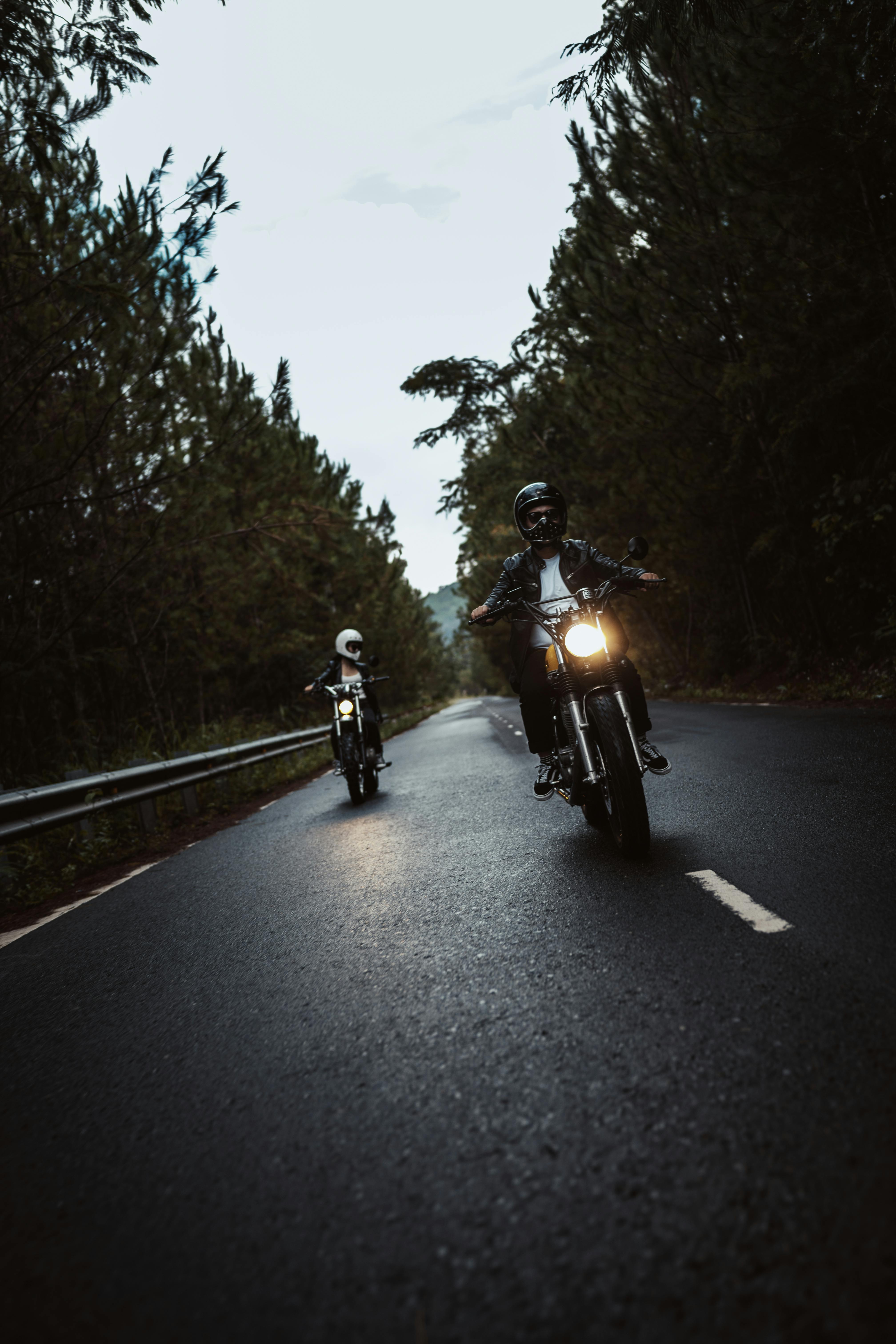 Men on Motorbikes in Among Trees · Free Stock Photo