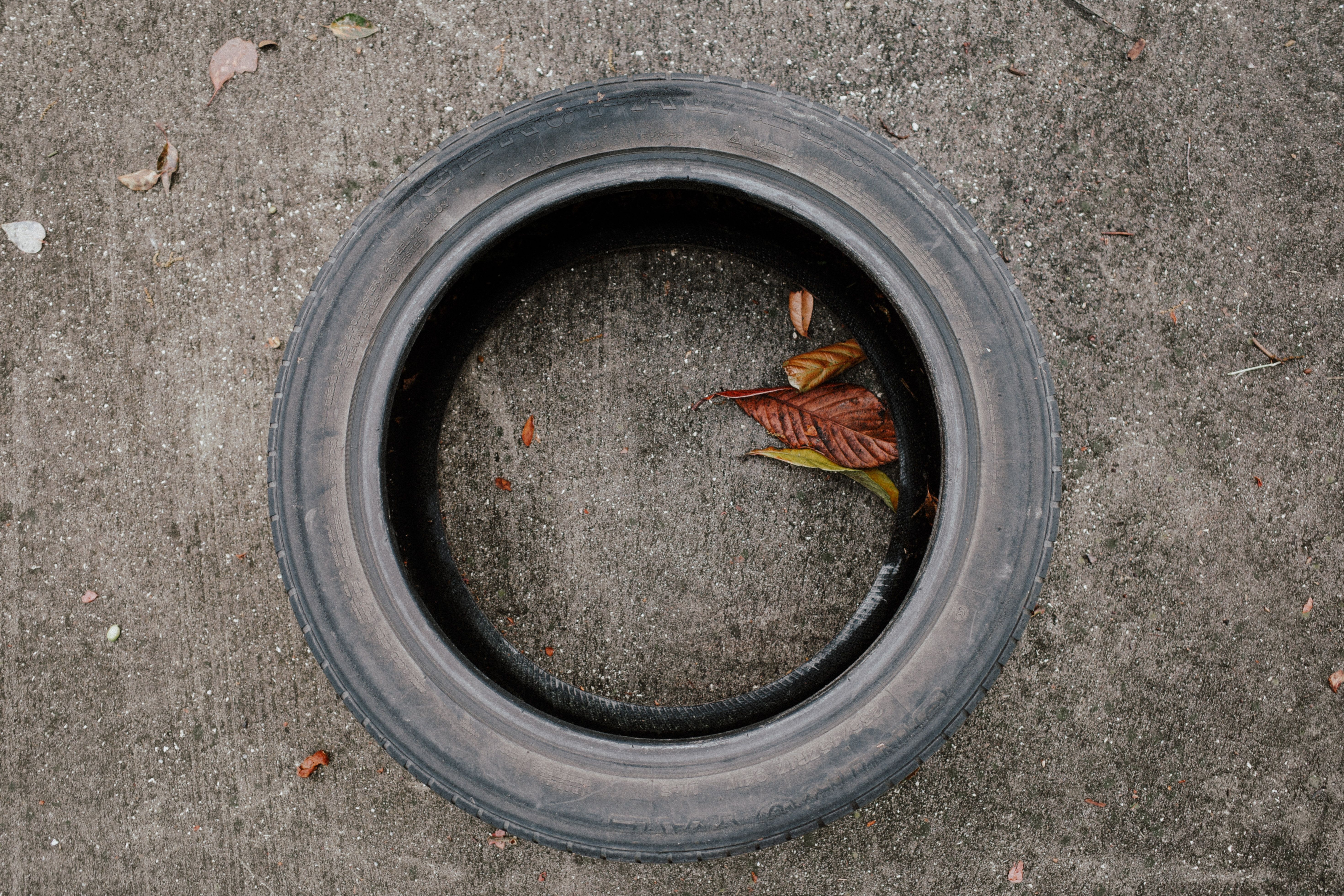 A Tire on the Ground · Free Stock Photo