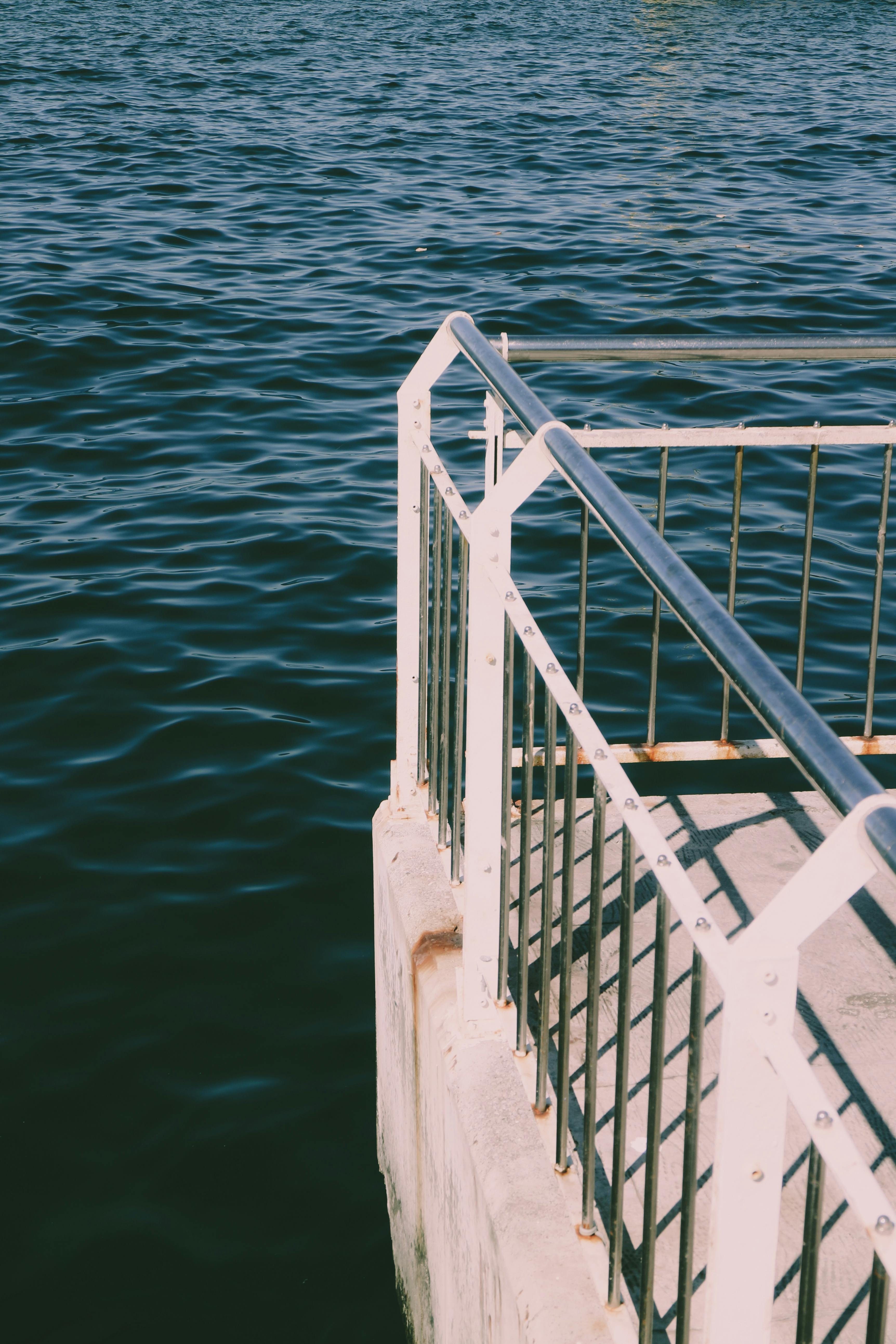 Railing of Barrier on Pier · Free Stock Photo