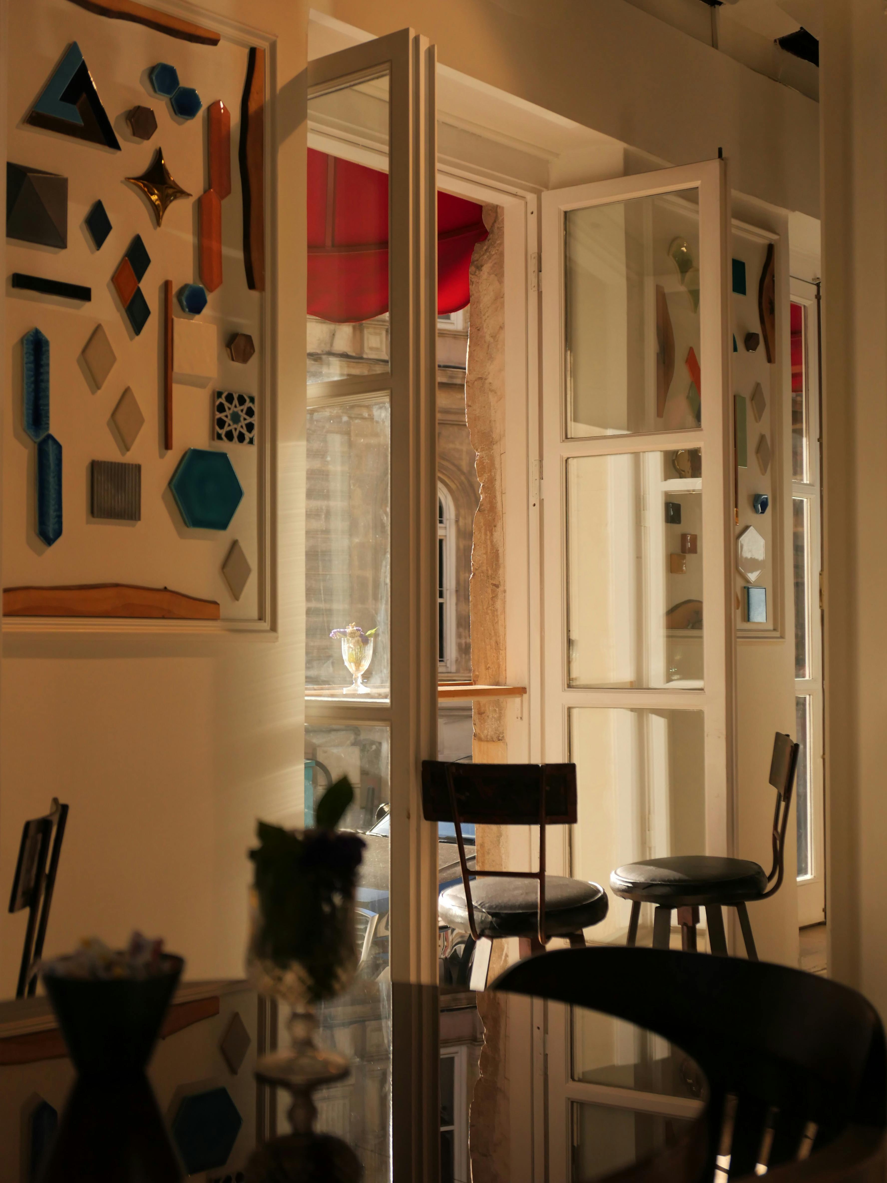 Cafe Table and Chairs by Open Window · Free Stock Photo