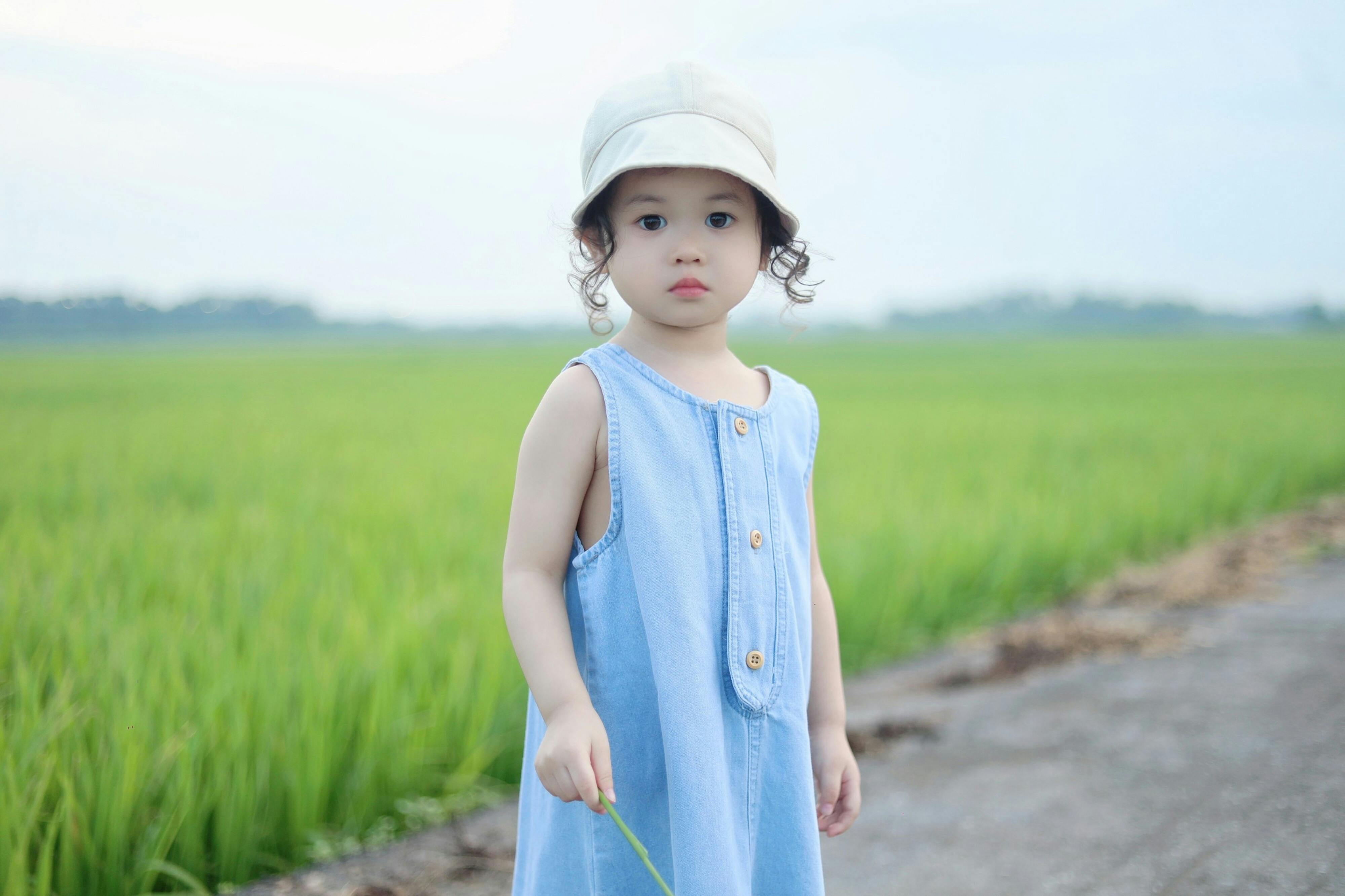Child Model in Blue Dress and Hat · Free Stock Photo