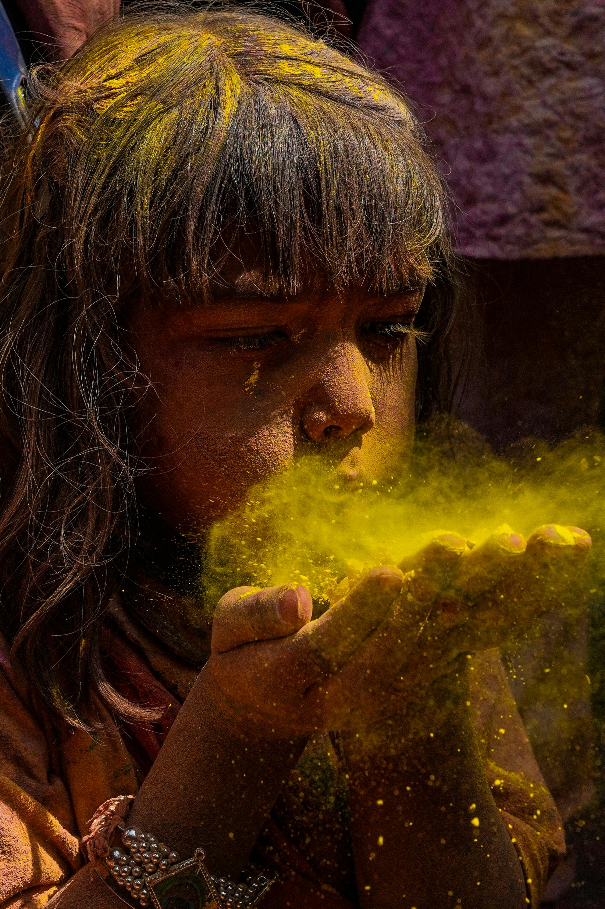 A Girl Blowing Powder · Free Stock Photo