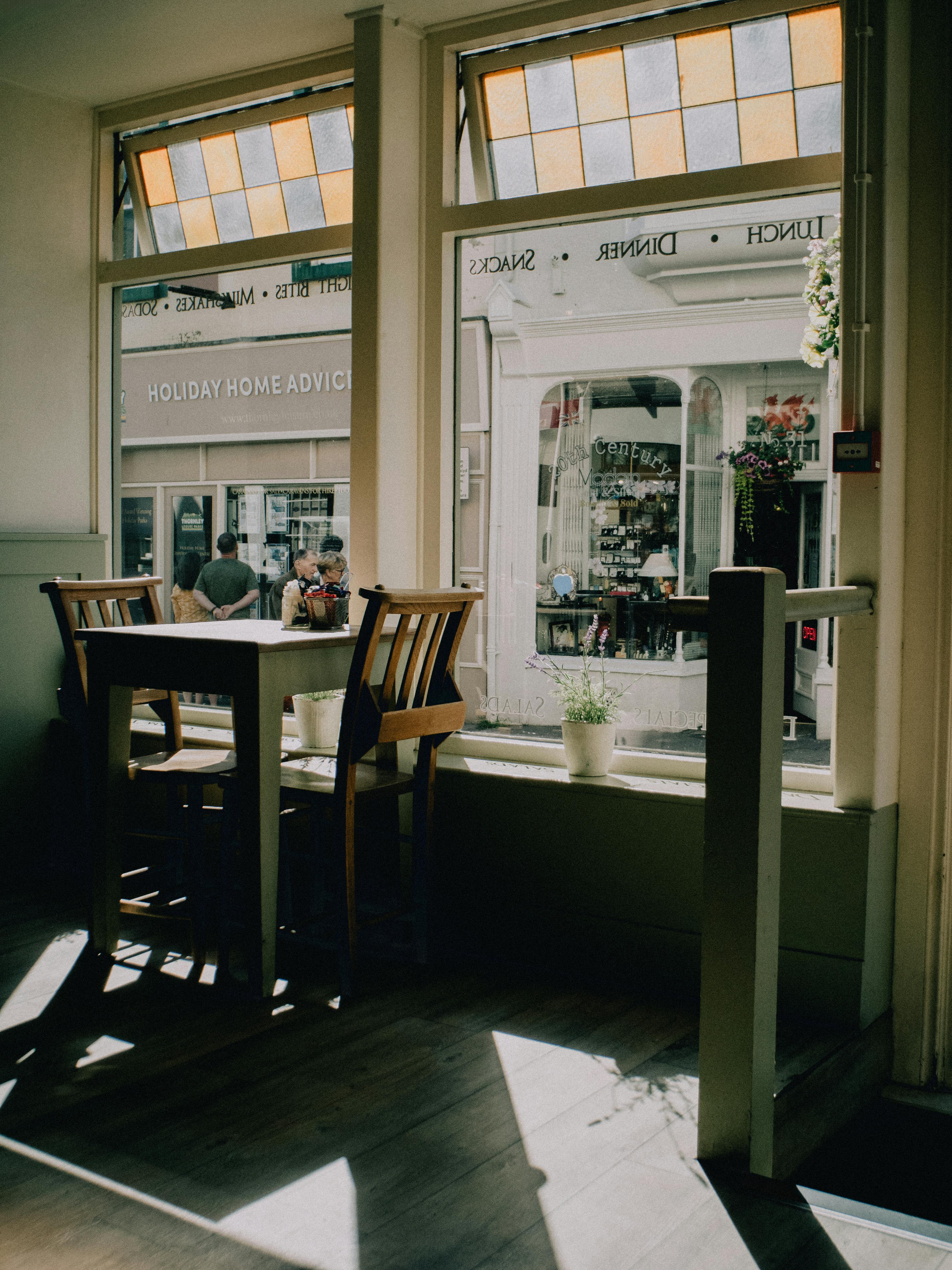 Woman Looking Out of a Window · Free Stock Photo