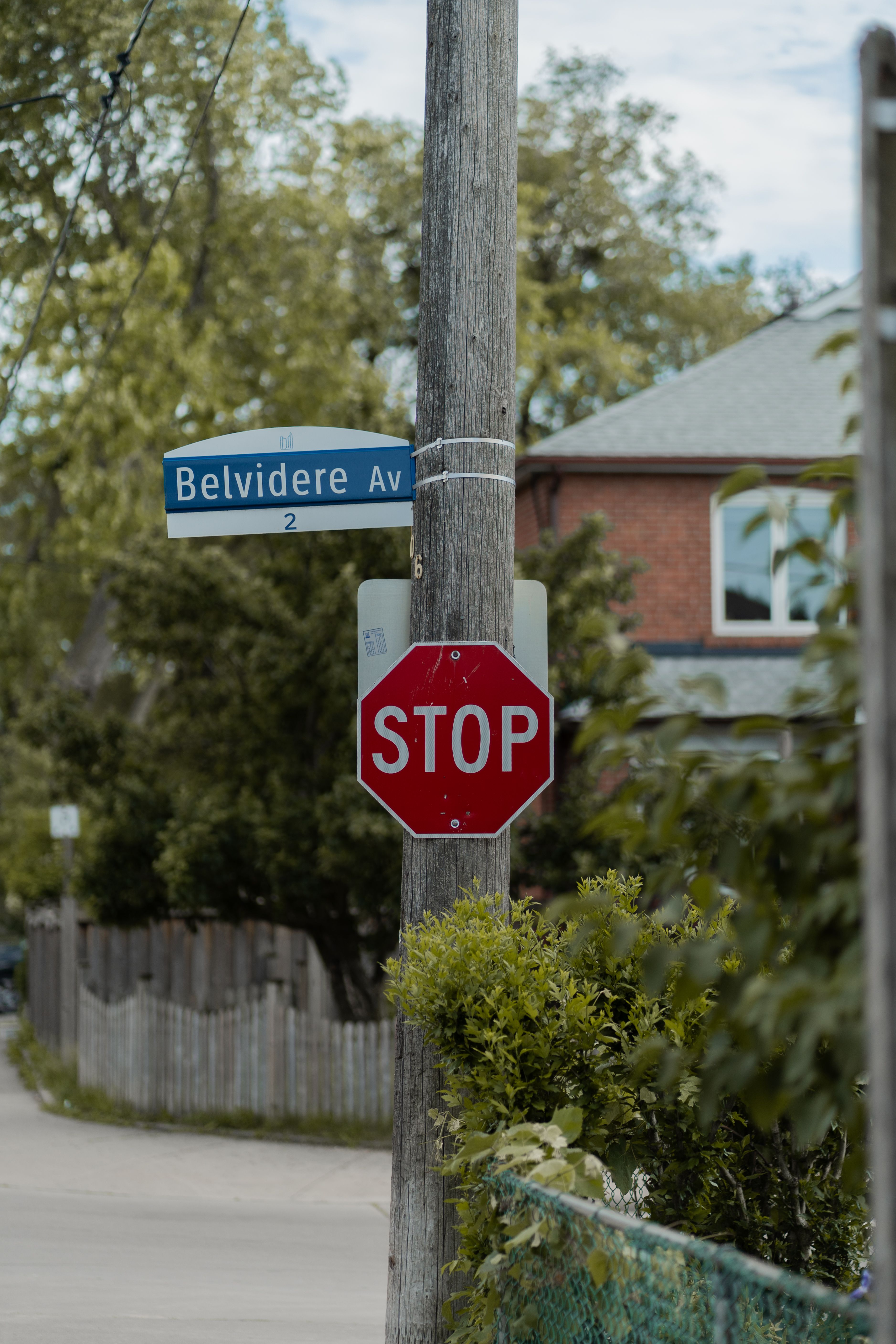 Red Stop Sign Hanging on the Pole · Free Stock Photo
