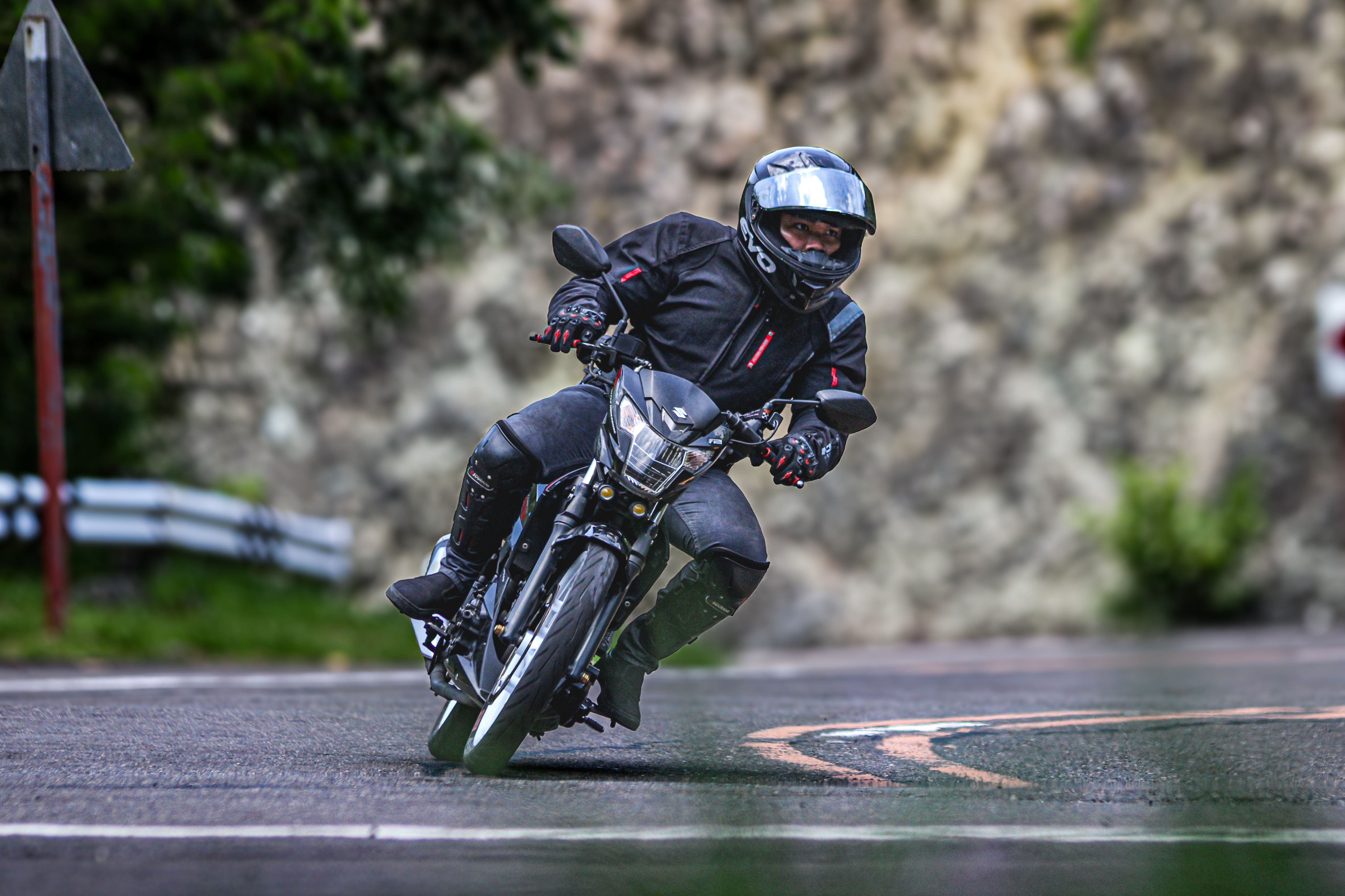 Rider on Motorcycle Taking a Bend · Free Stock Photo