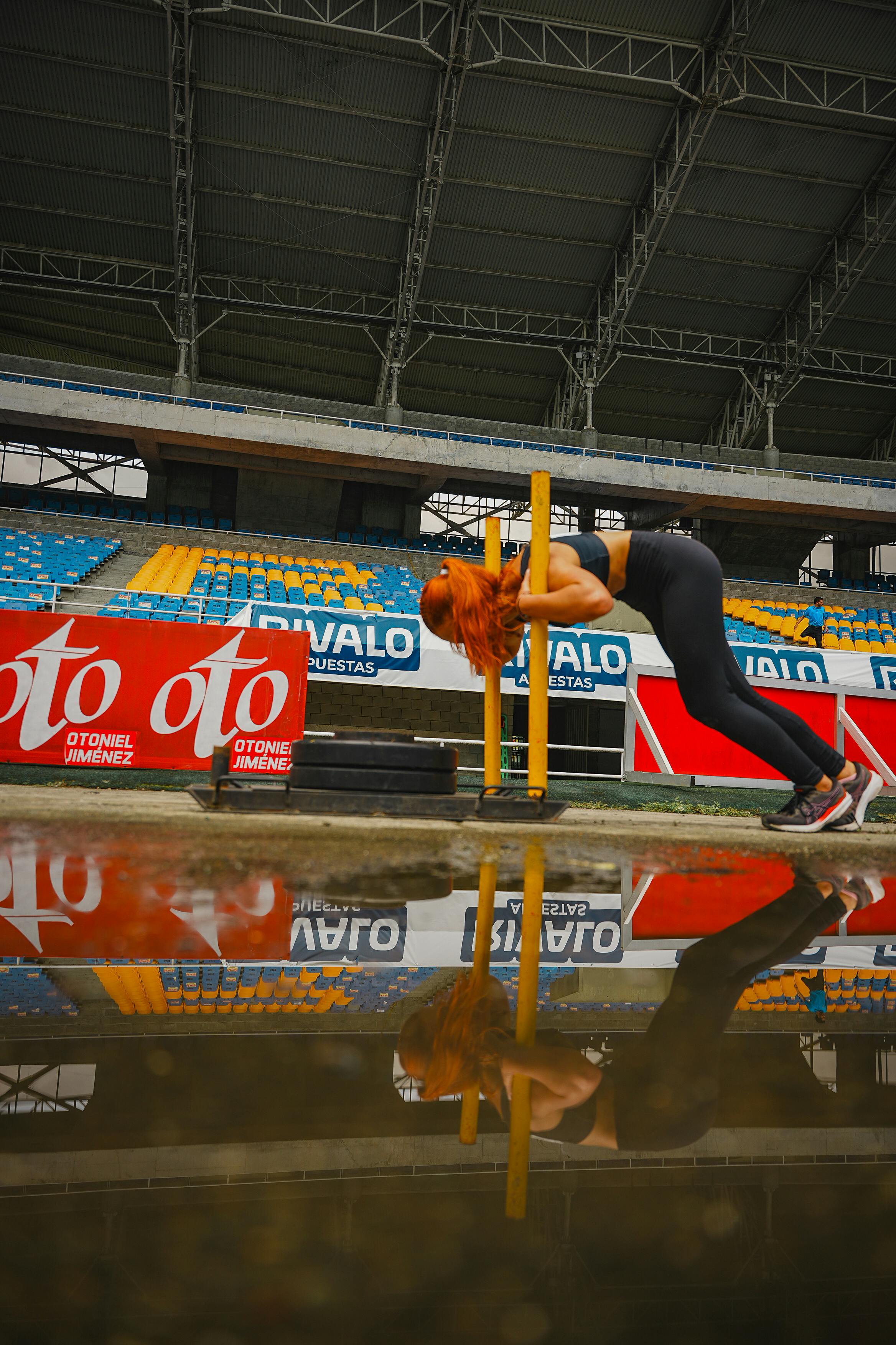 Woman Overcoming Obstacle Course · Free Stock Photo