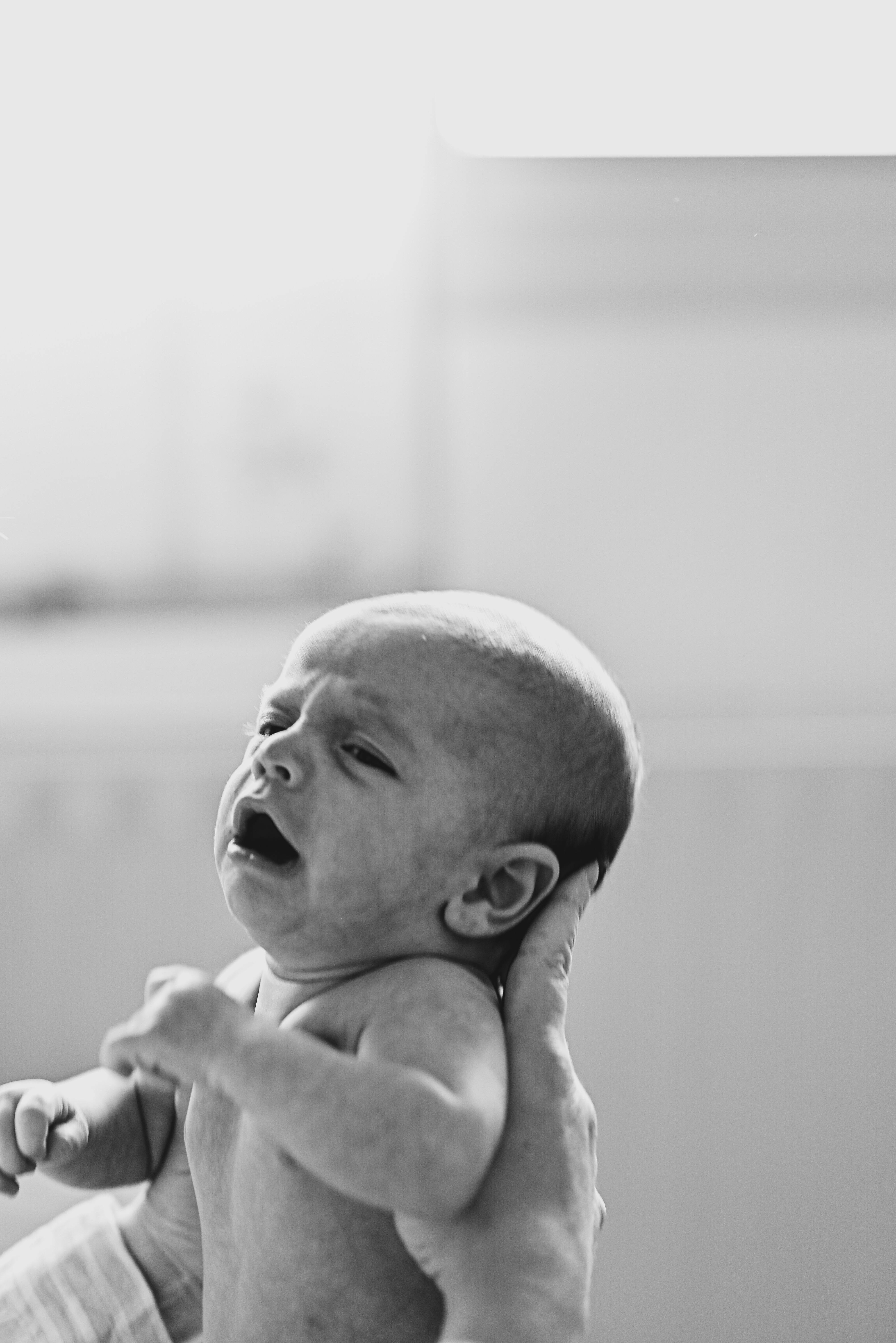 A black and white photo of a baby crying · Free Stock Photo
