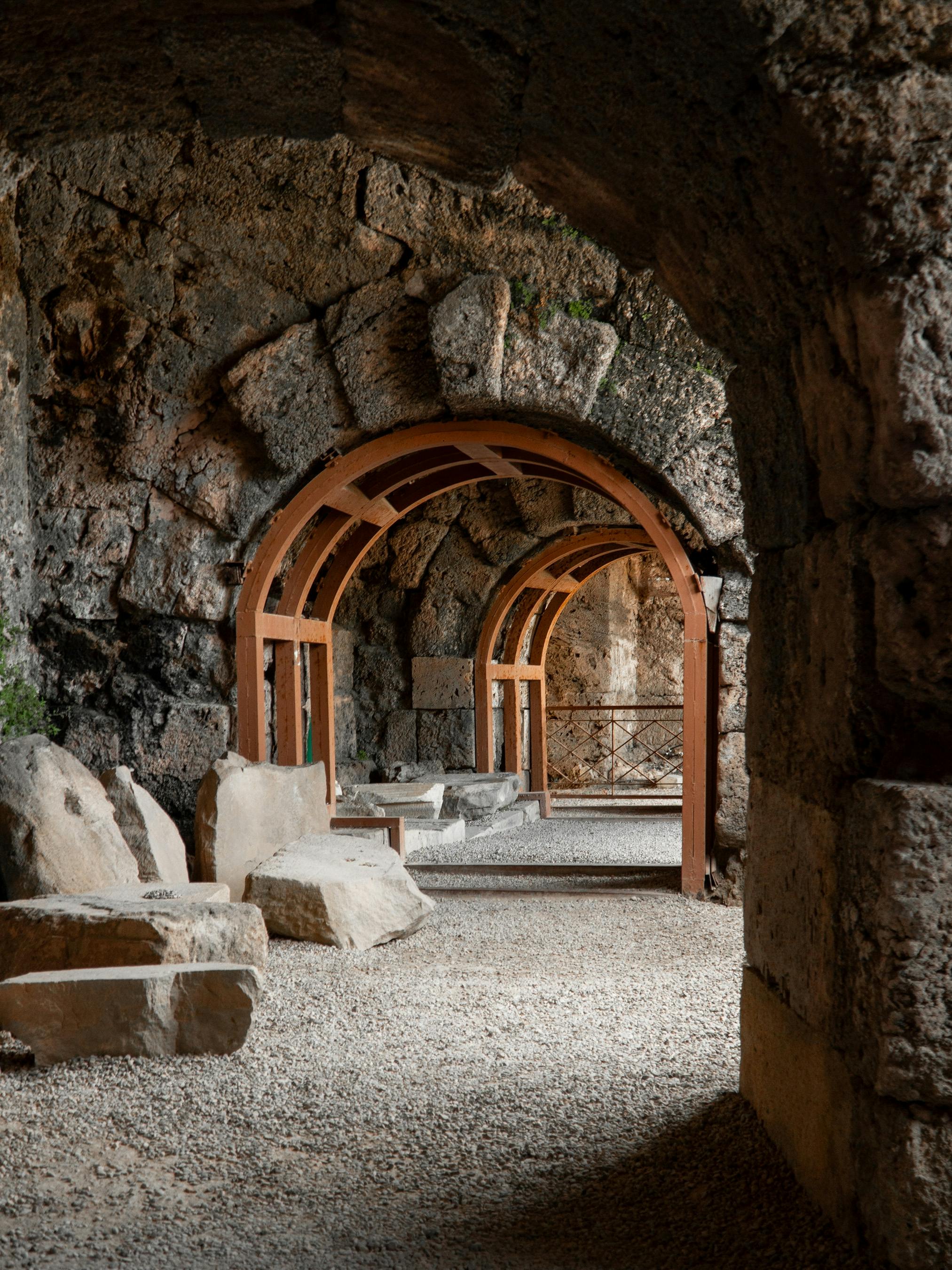 Corridor in Stone Building with Arches · Free Stock Photo