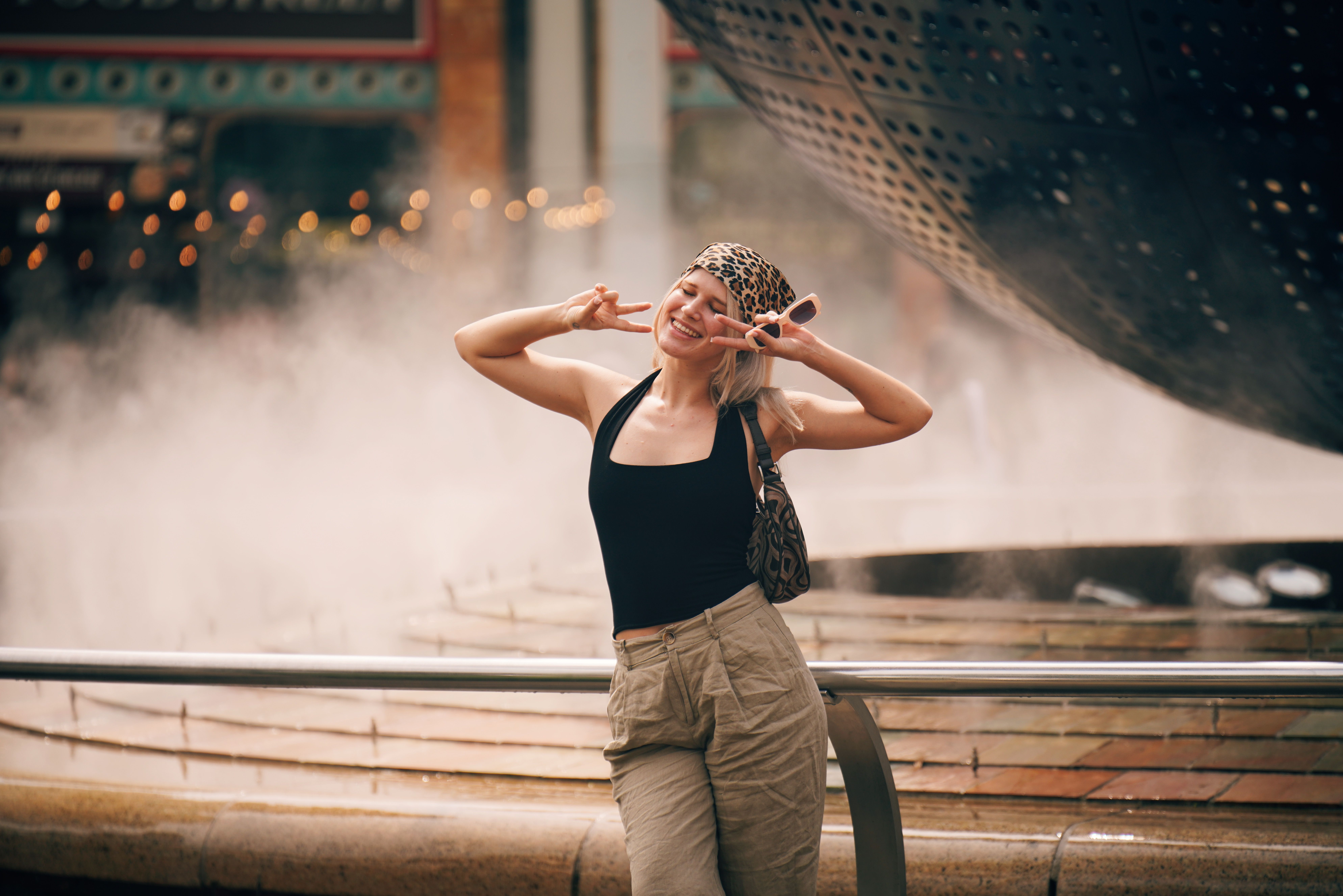 Blonde Woman Standing in Buff and Tank Top · Free Stock Photo